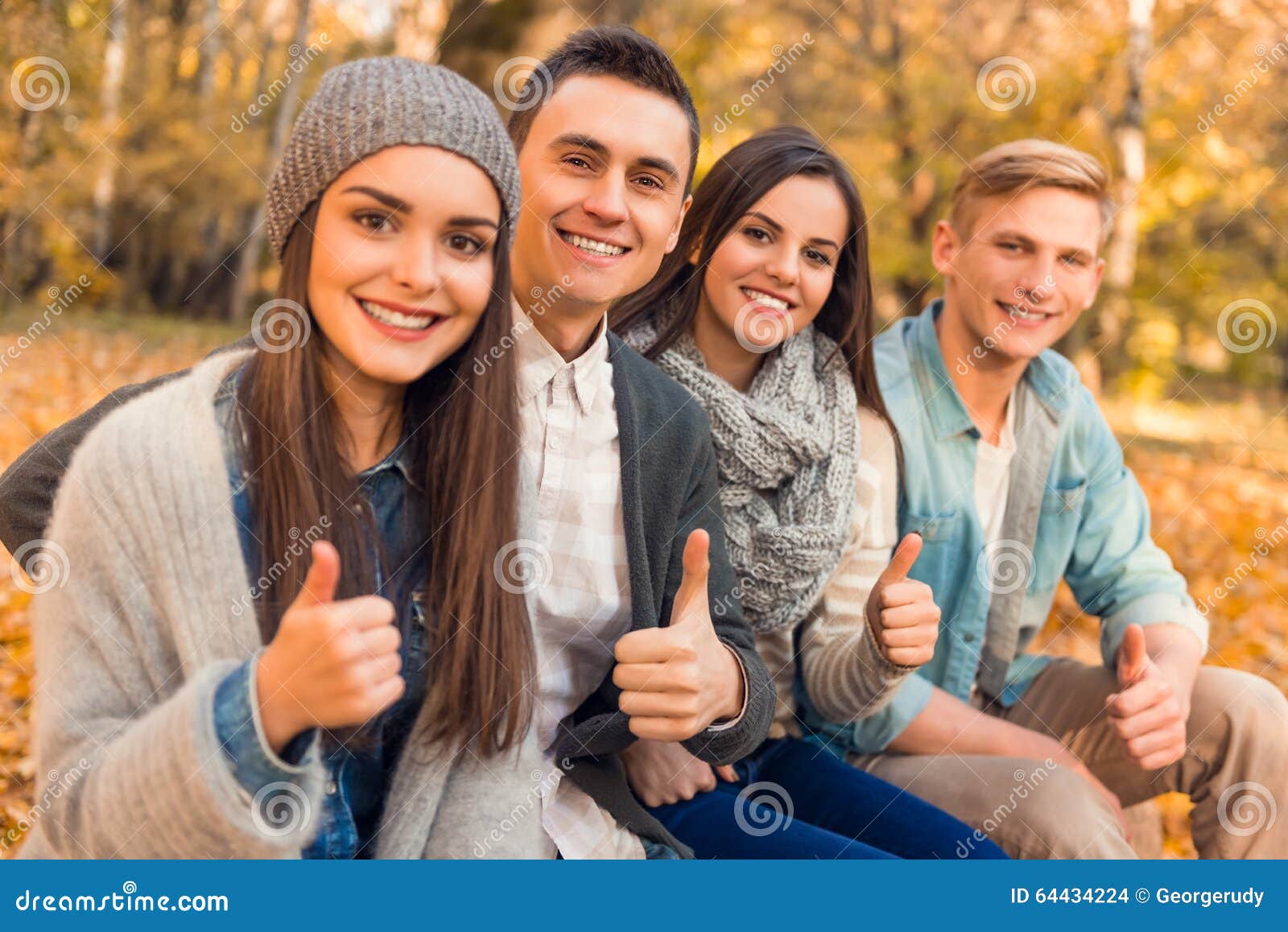 Students in autumn park stock photo. Image of education - 64434224