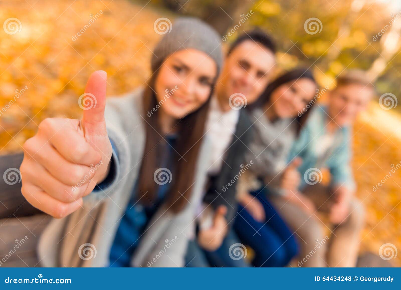 Students in autumn park stock photo. Image of friendship - 64434248