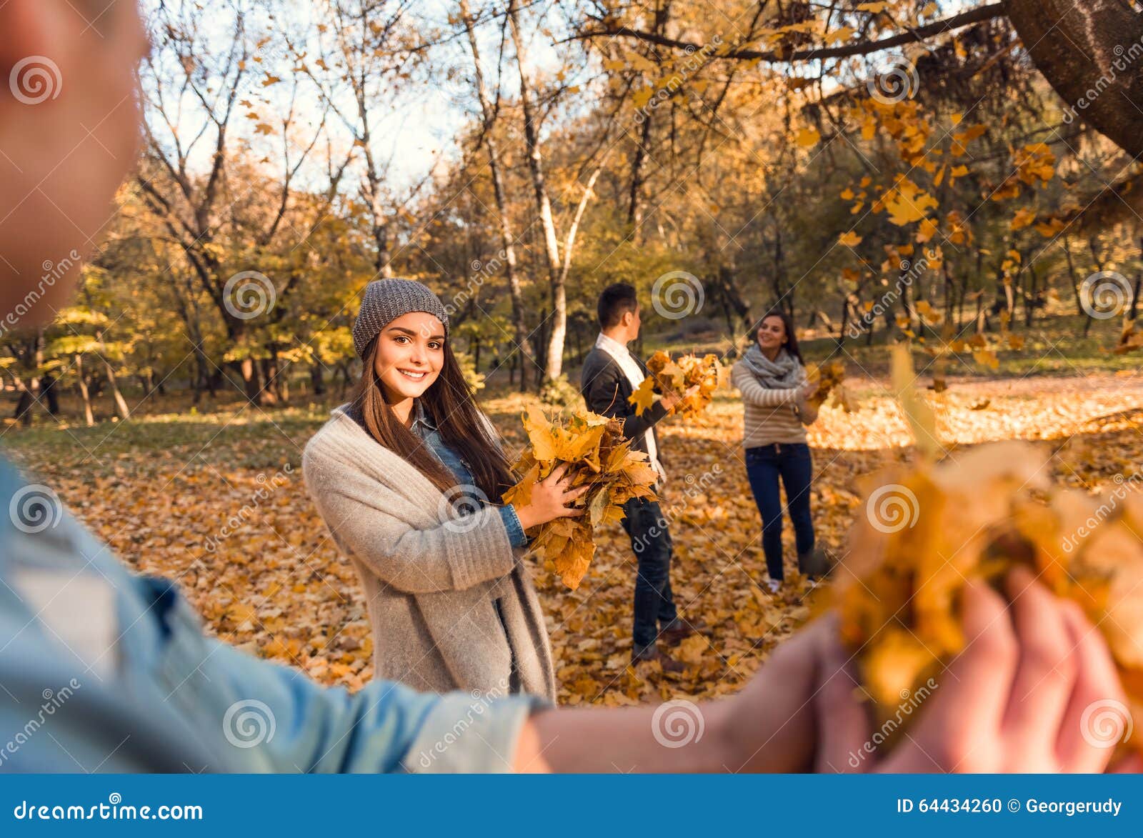 Students in autumn park stock photo. Image of autumn - 64434260
