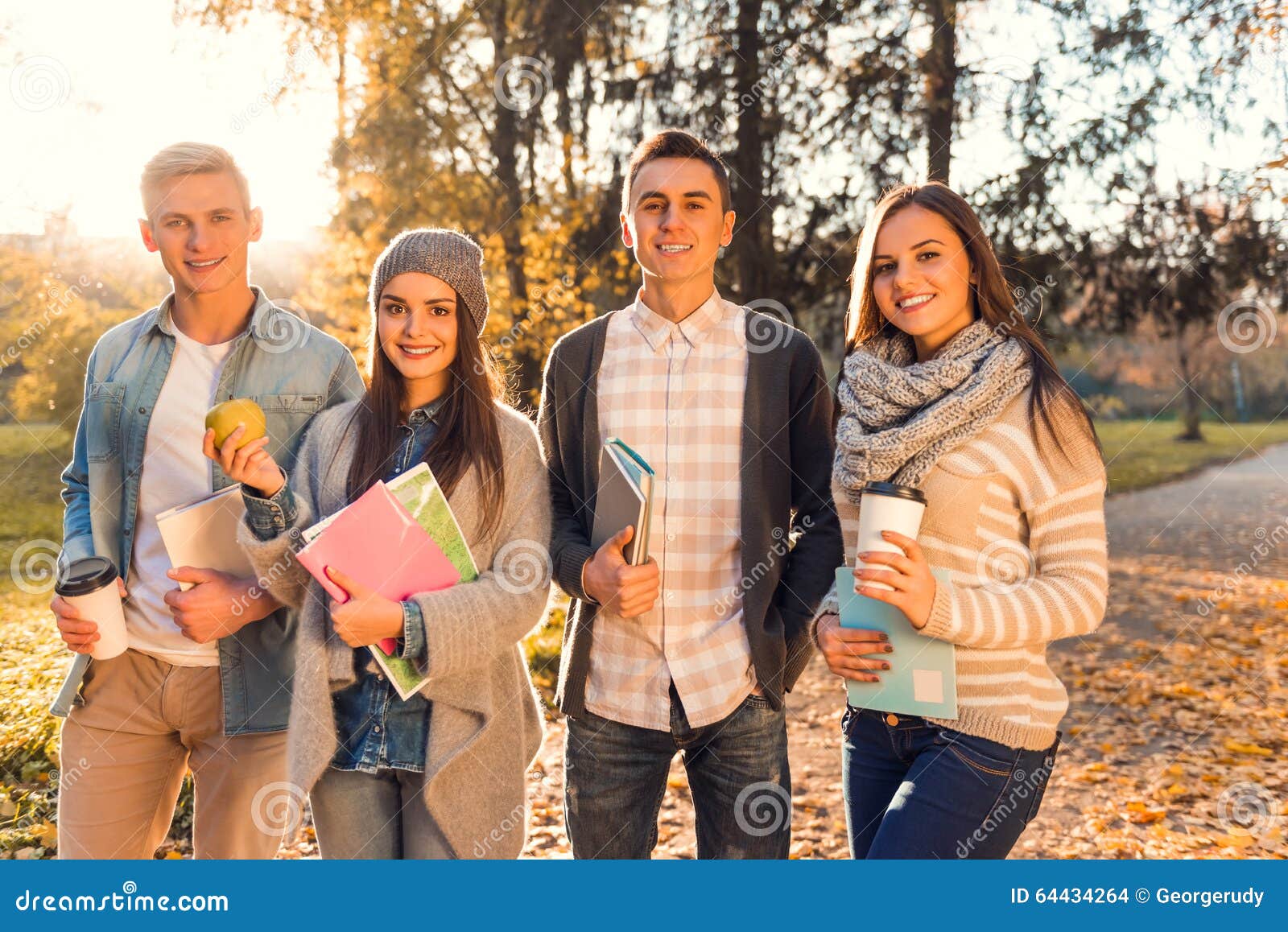 Students in autumn park stock photo. Image of outdoors - 64434264
