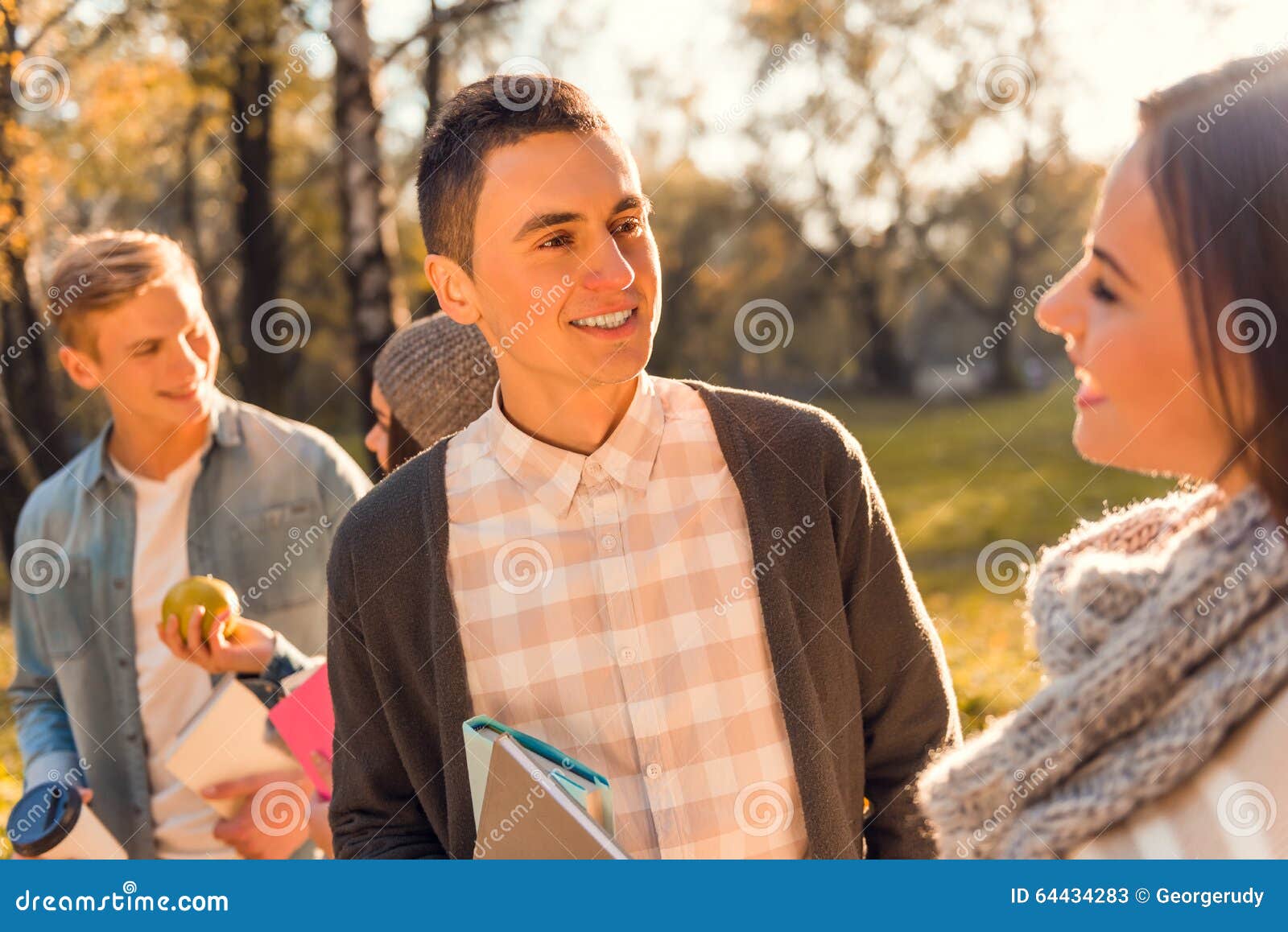 Students in autumn park stock image. Image of girls, happy - 64434283