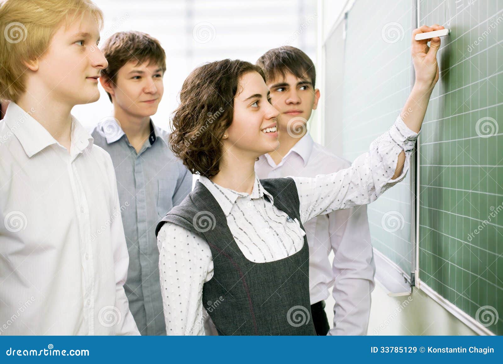 Students at the blackboard stock image. Image of schoolchildren - 33785129
