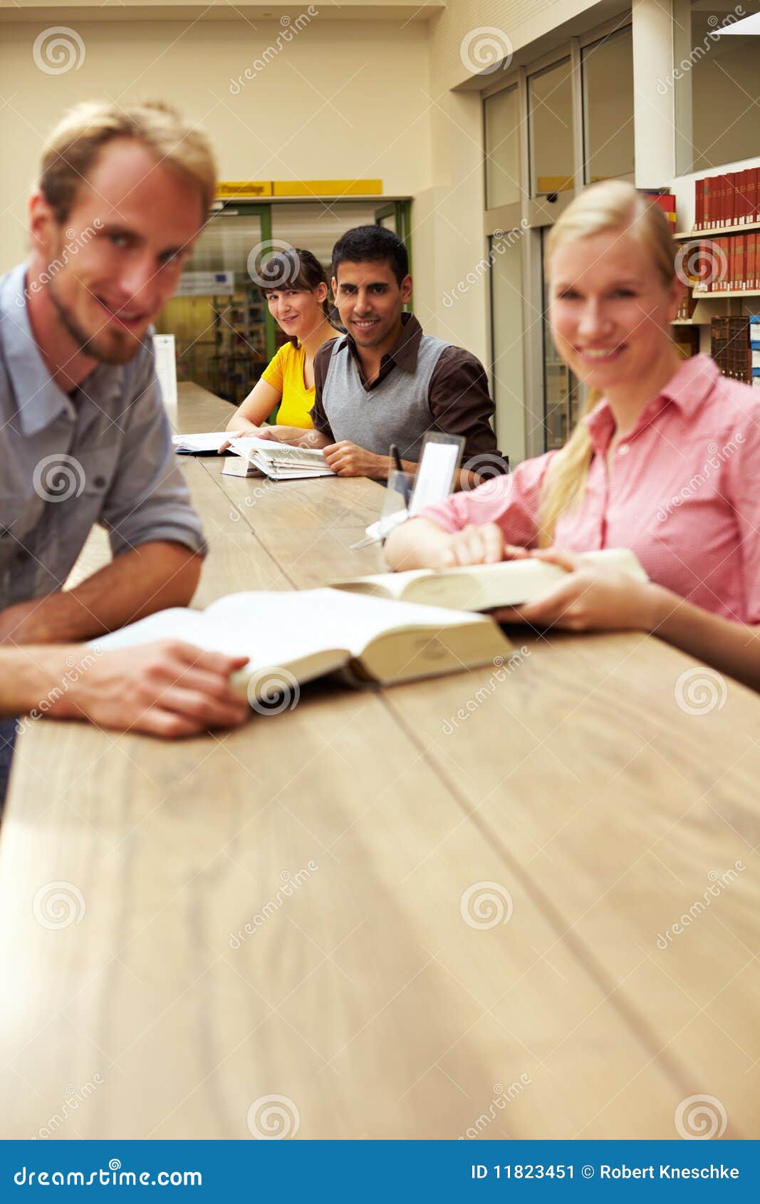 Students with books stock image. Image of hall, people - 11823451