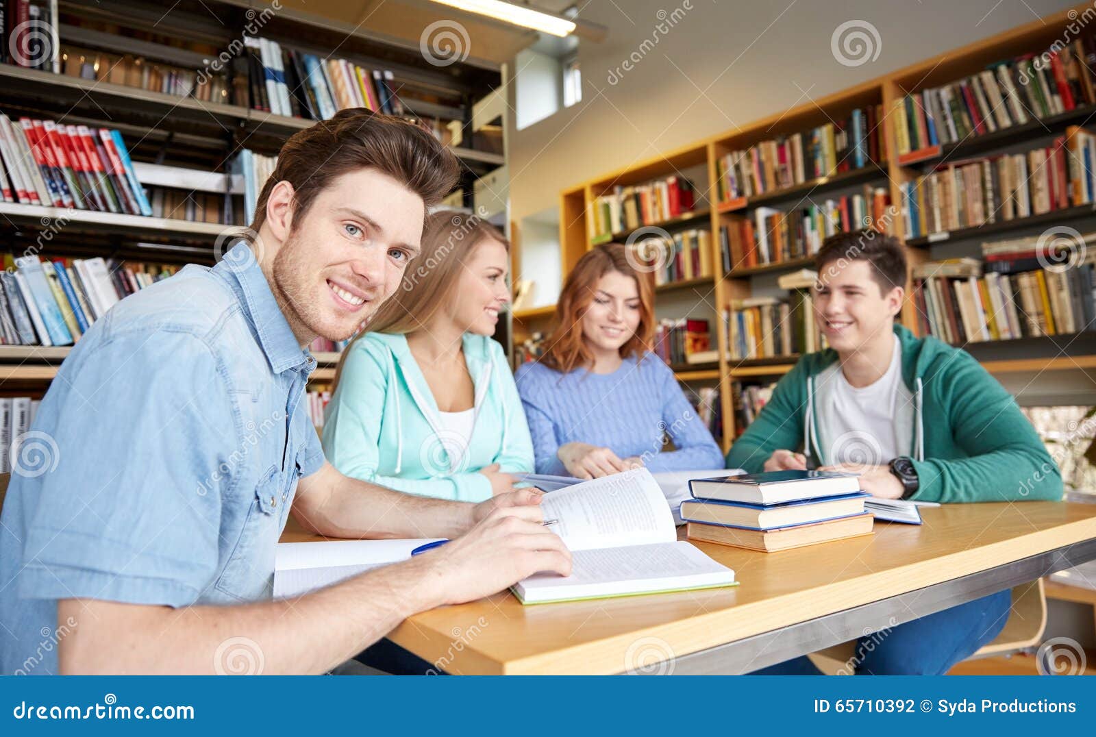 Students with Books Preparing To Exam in Library Stock Photo - Image of ...