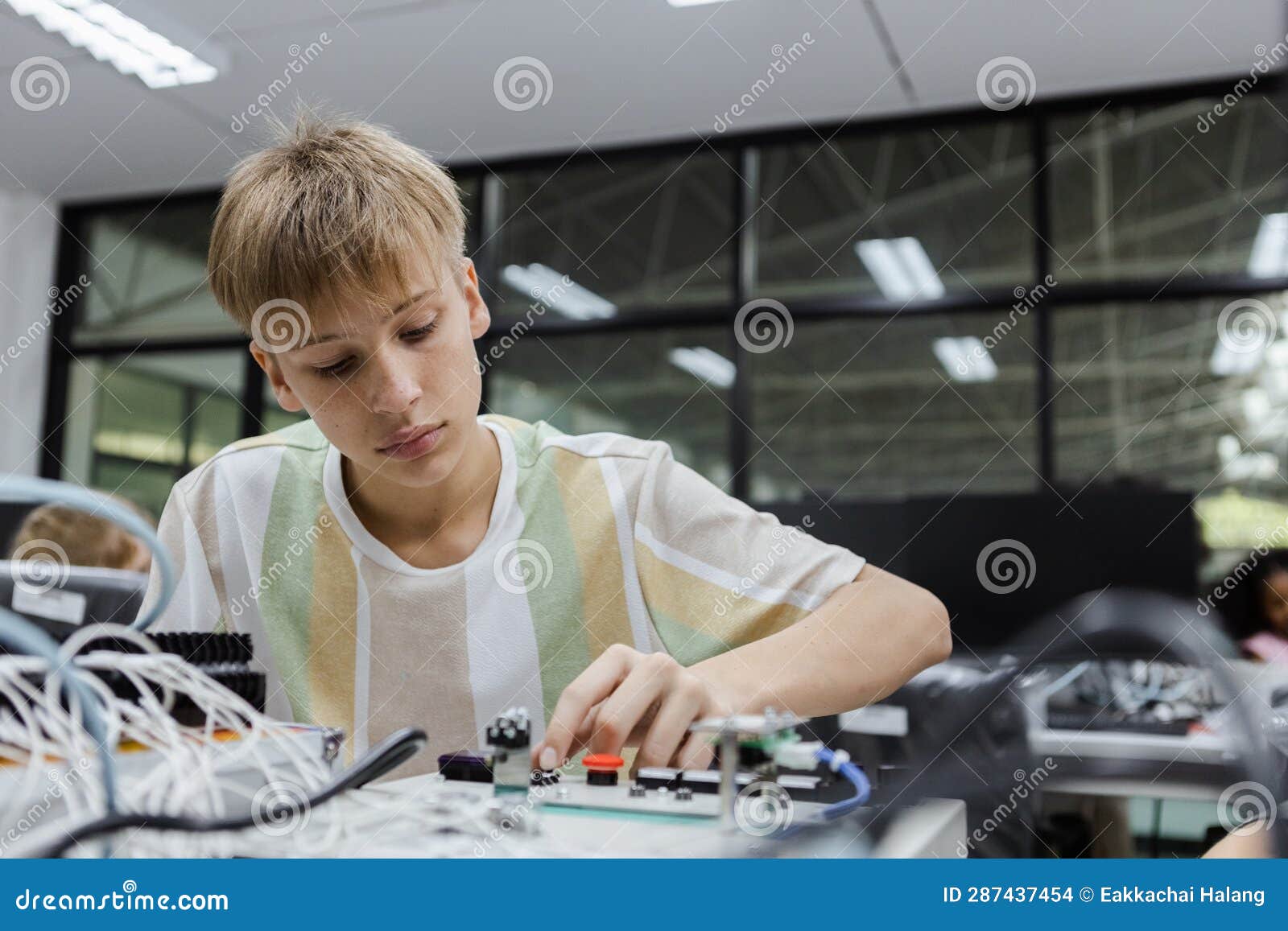 Students Boy Learning Electrical Appliances. Education on Table at ...