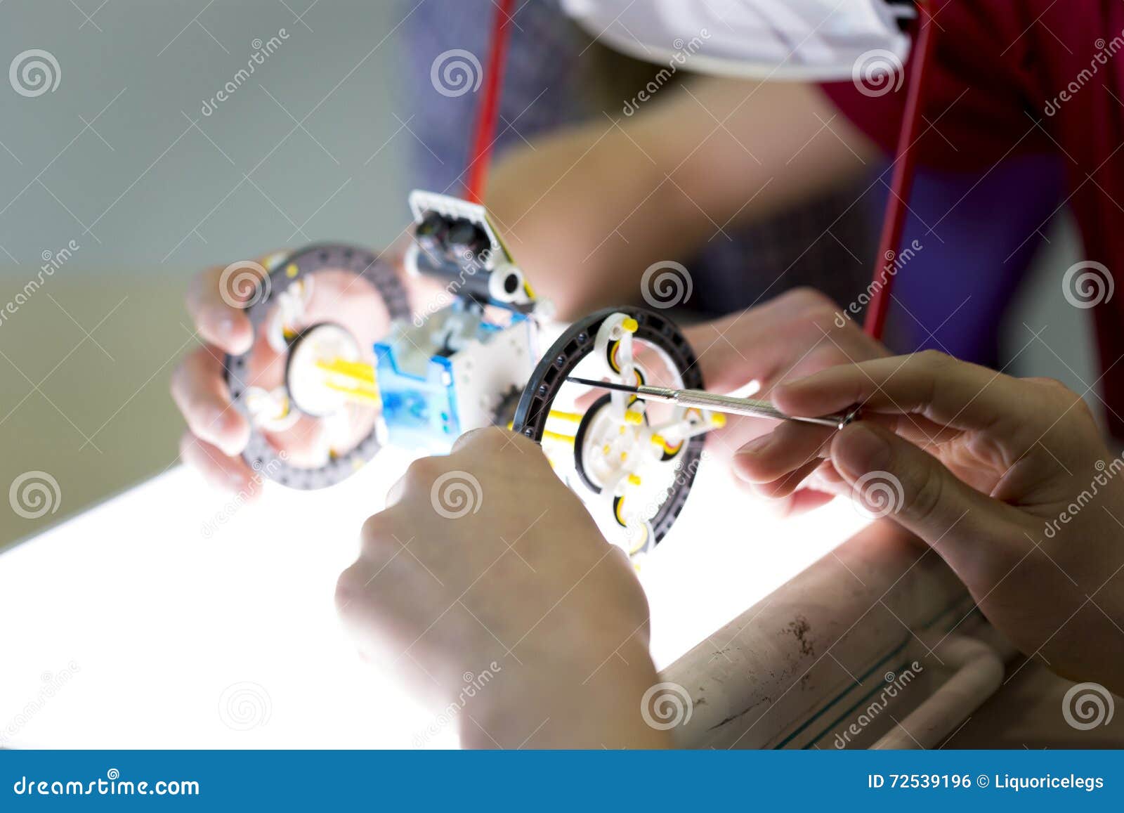 Students Building a Robot stock photo. Image of classroom - 72539196