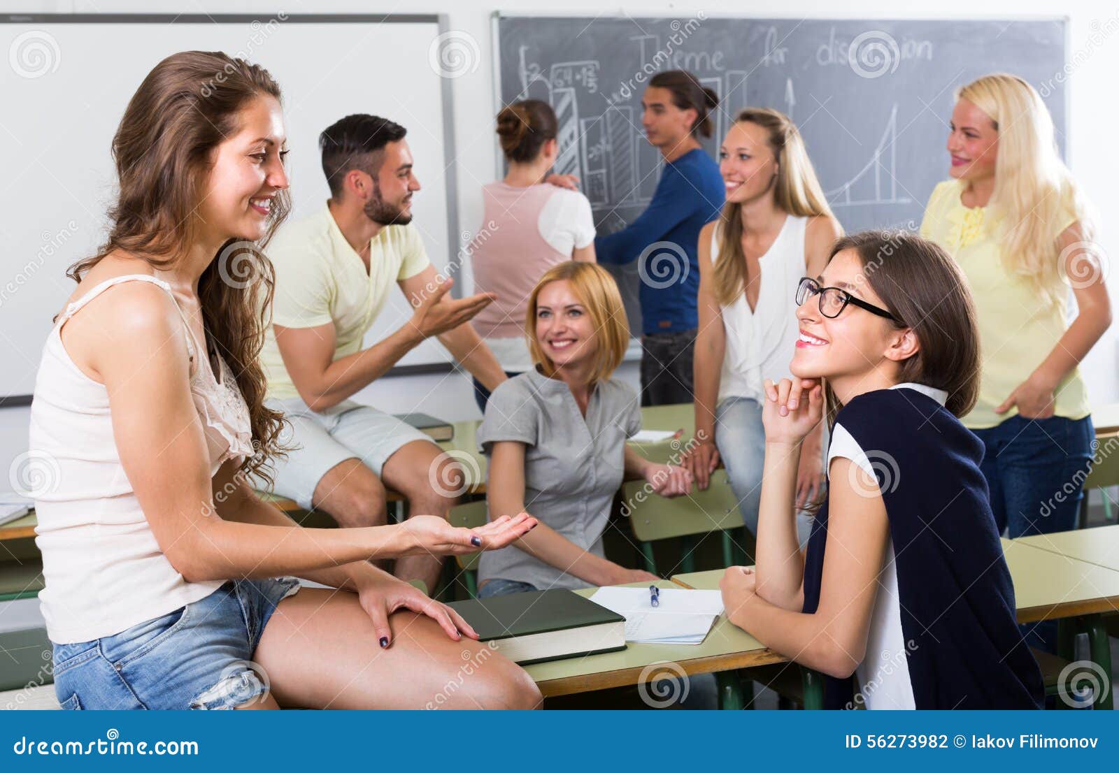 Students Chatting while Sitting in the Room Stock Photo - Image of ...