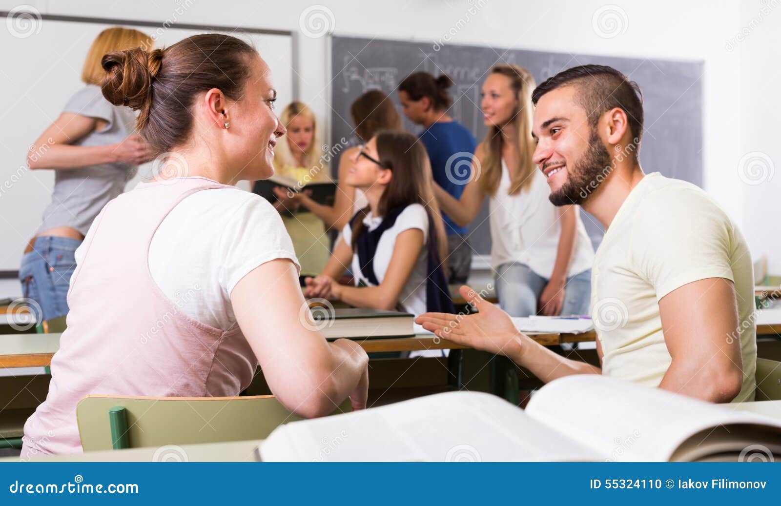 Students Chatting while Sitting in the Room Stock Photo - Image of ...