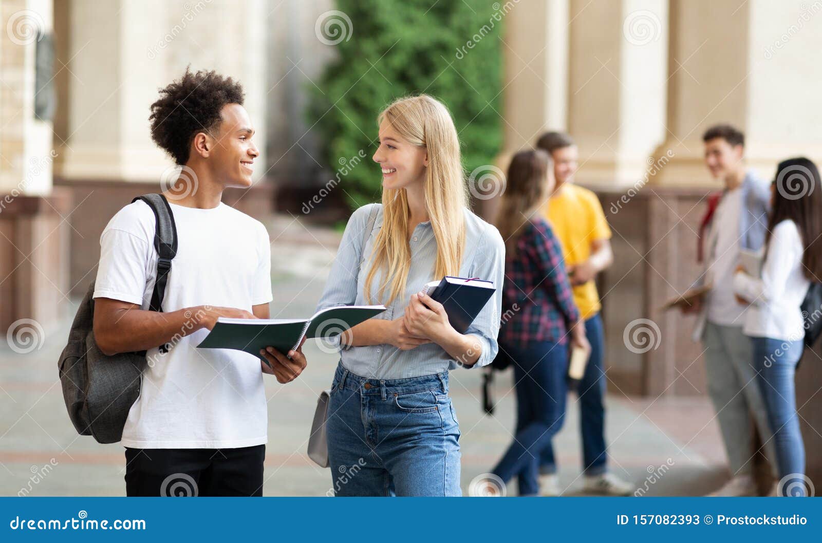 Students Chatting, Walking in University Campus between Classes Stock ...