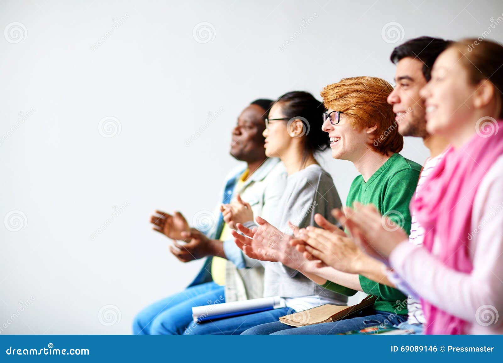 Students clapping hands stock photo. Image of session - 69089146