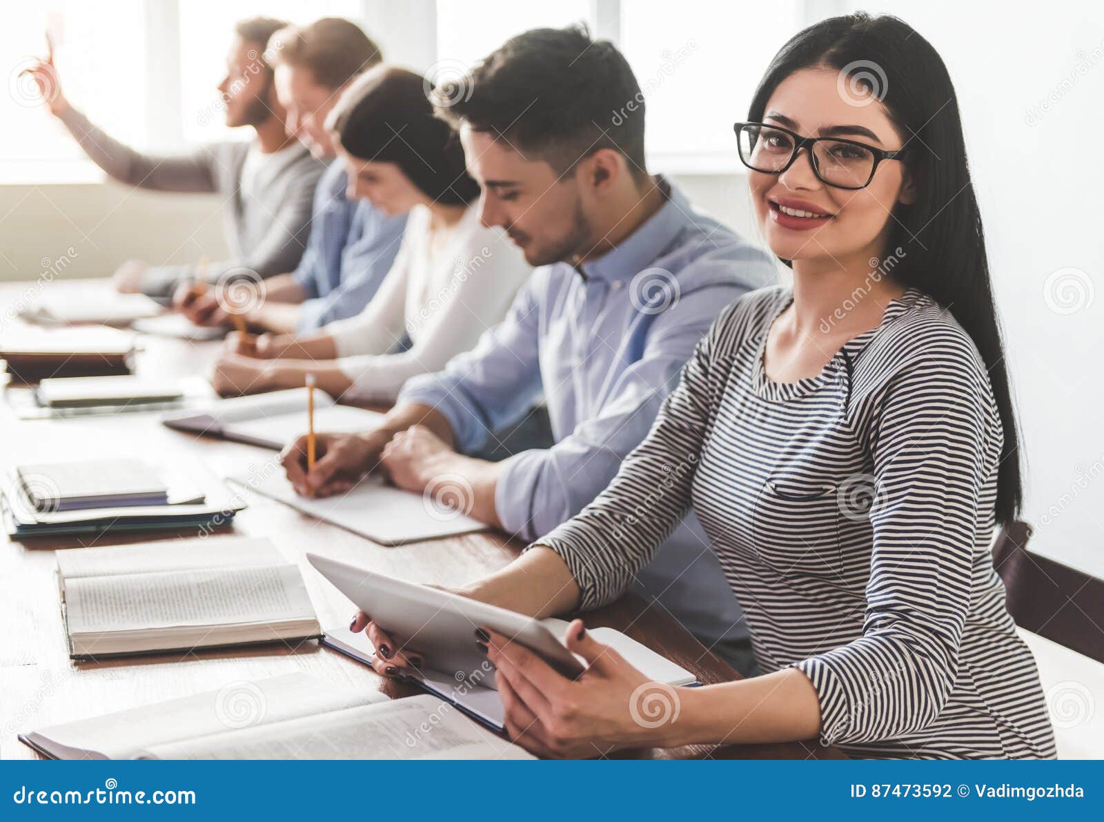 Students during the class stock photo. Image of notebooks - 87473592