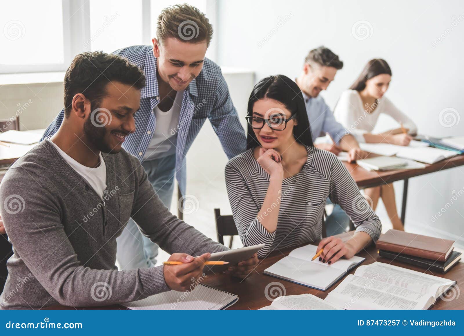 Students during the class stock image. Image of books - 87473257