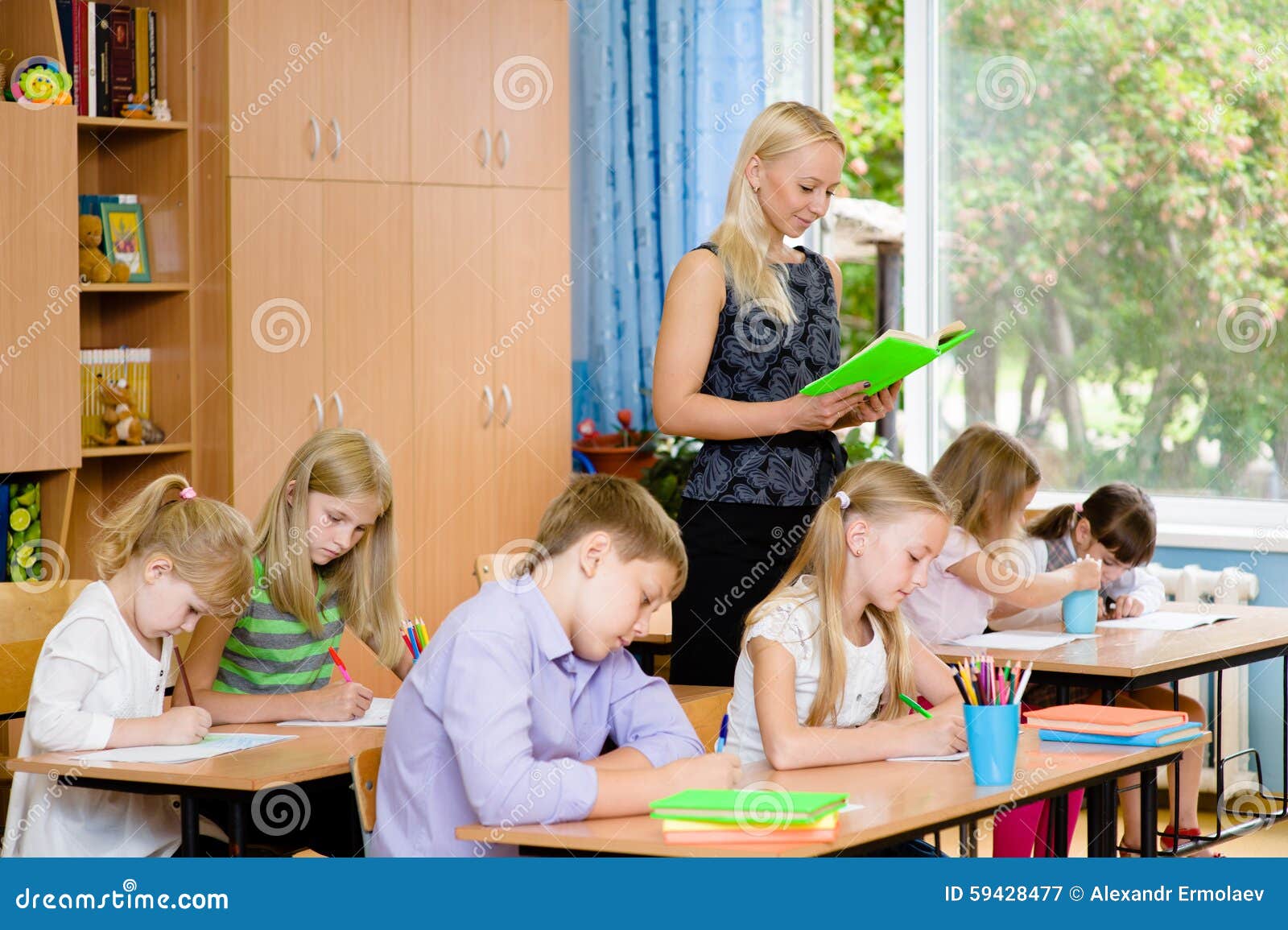 Students in the Class Write Assignments that Reads Them a Young Stock ...