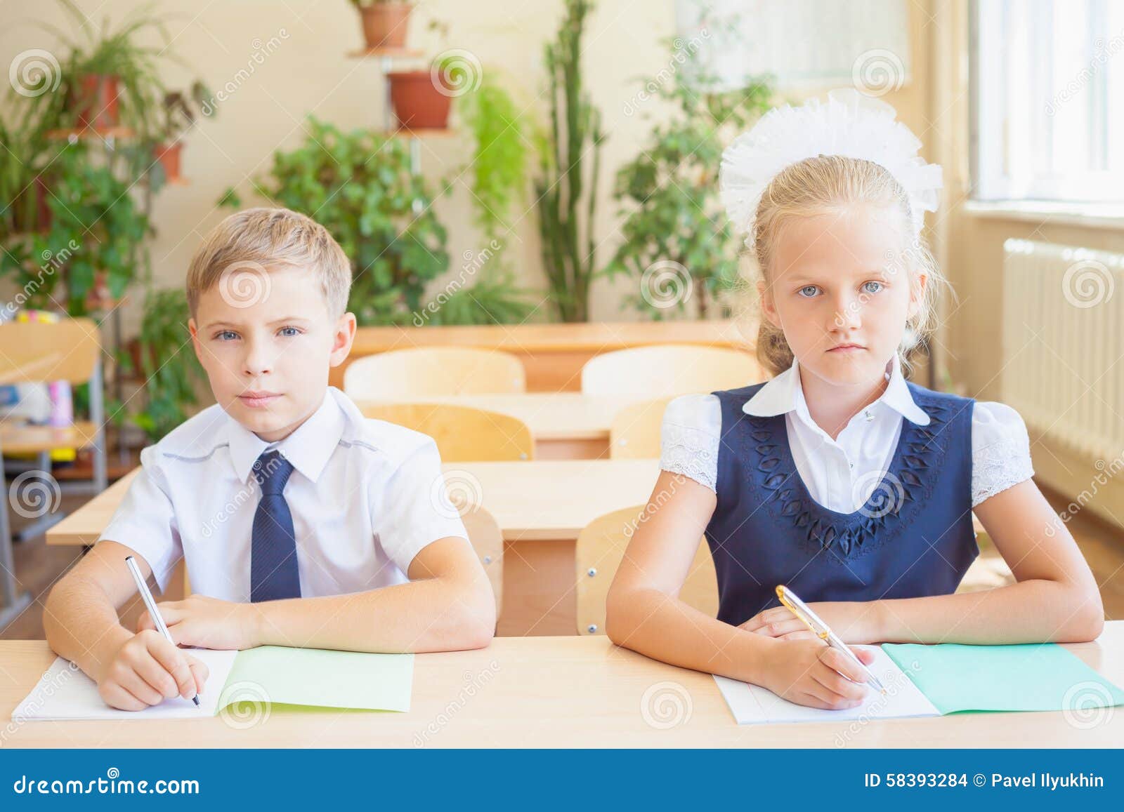 Students or Classmates in School Classroom Sitting Together at Desk ...