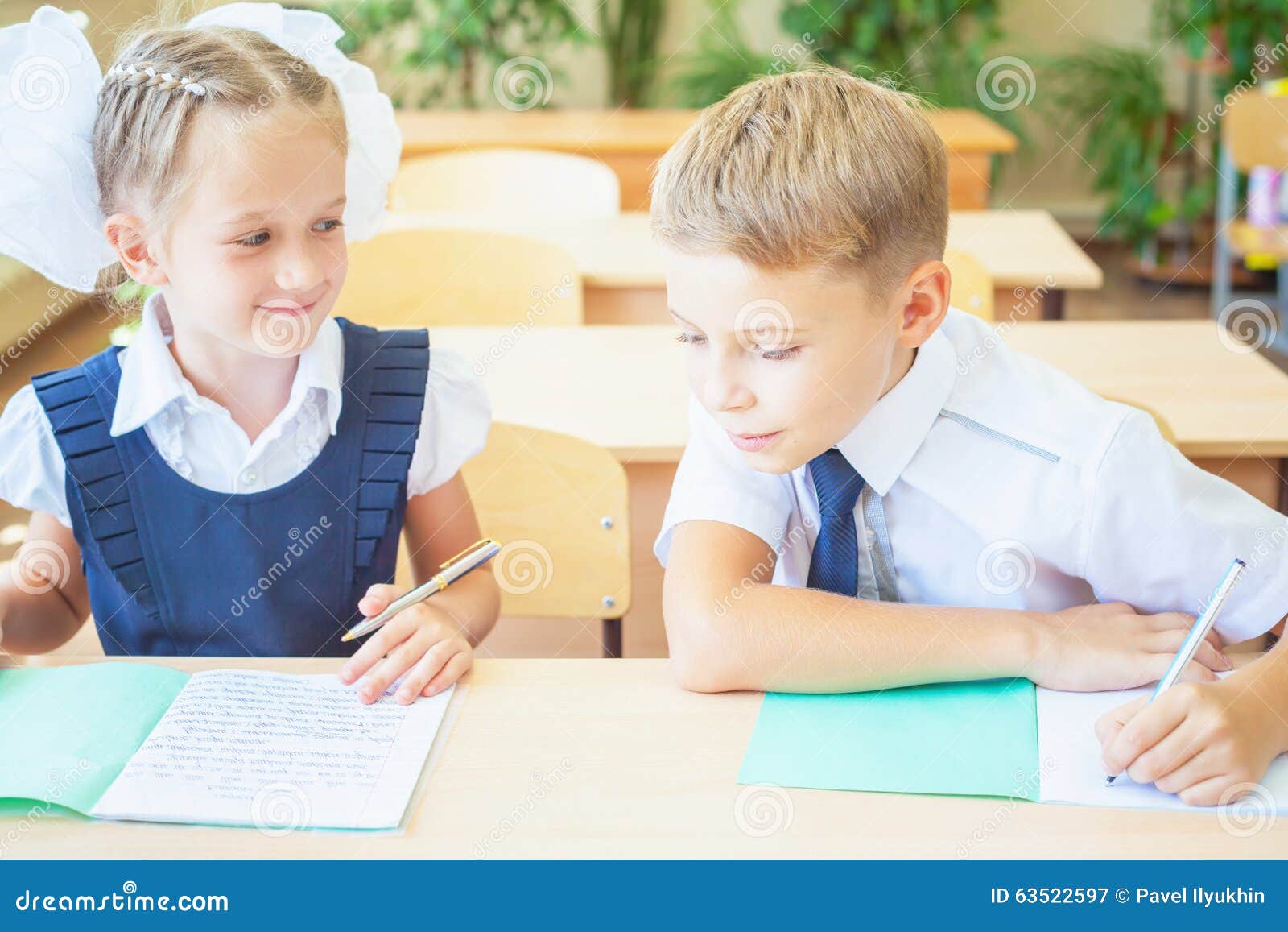Students or Classmates in School Classroom Sitting Together at Desk ...