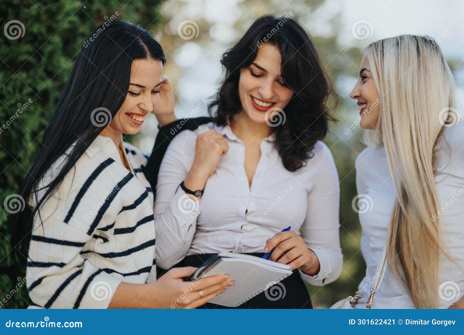 Students Collaborating Outdoors, Discussing and Solving Problems ...