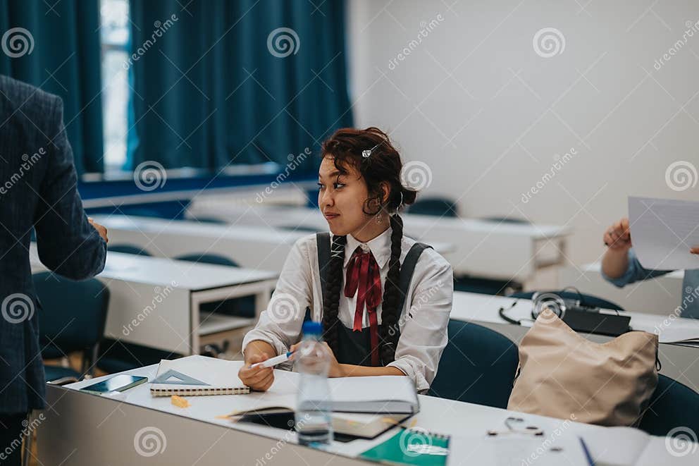 Students Collaborating with Professor during a Classroom Activity ...