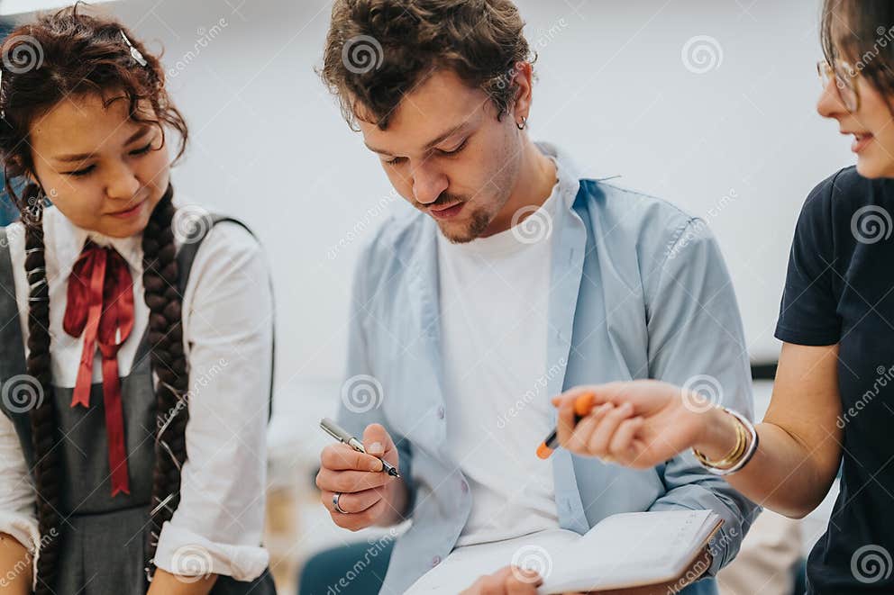 Students Collaborating on a School Project in Classroom Setting Stock ...