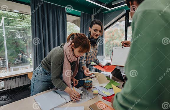 Students Collaborating on School Tasks in a Modern Classroom Setting ...