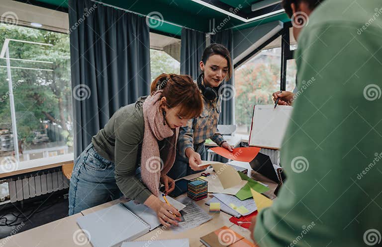 Students Collaborating on School Tasks in a Modern Classroom Setting ...