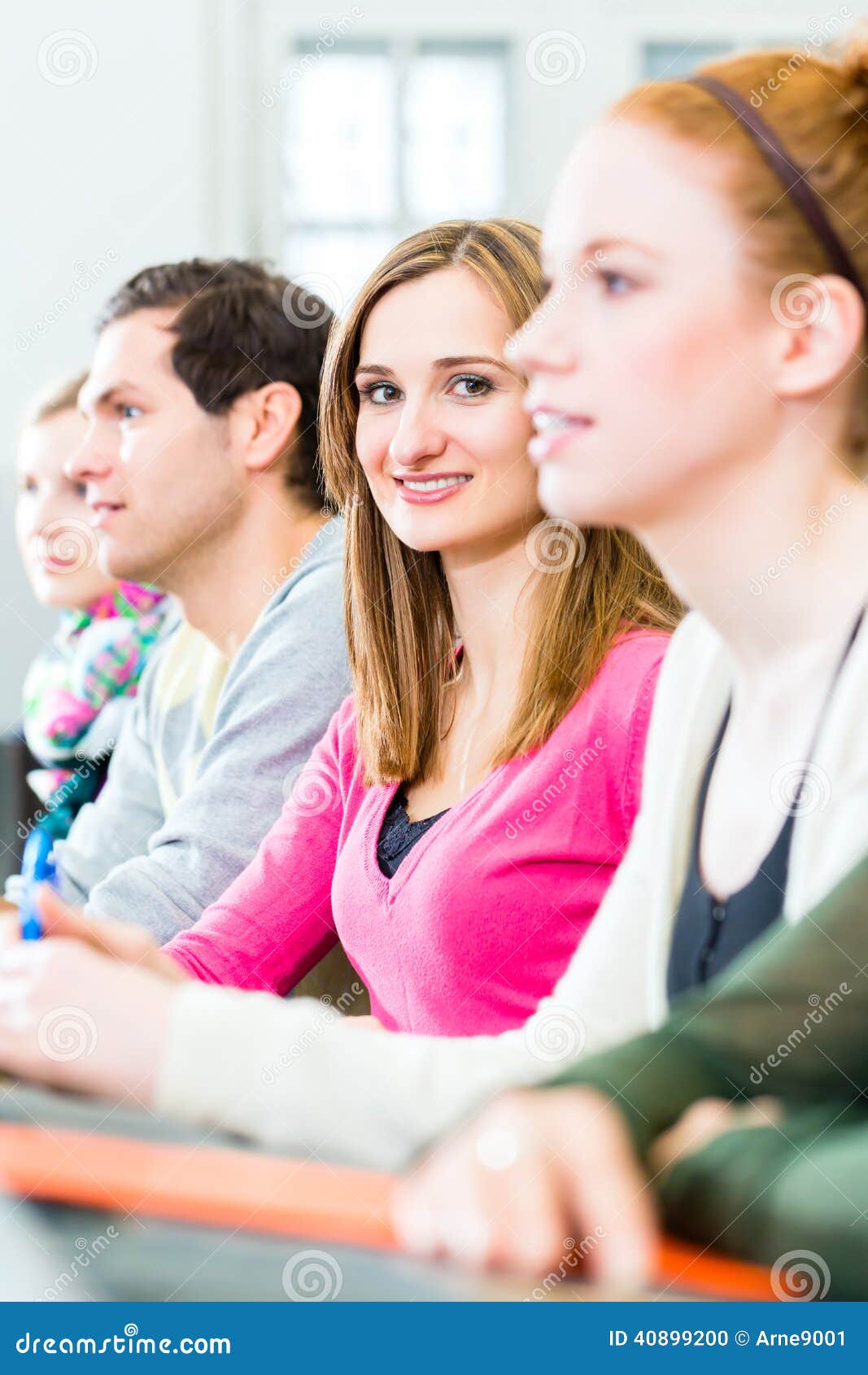 Students in College Learning Stock Photo - Image of notes, listening ...