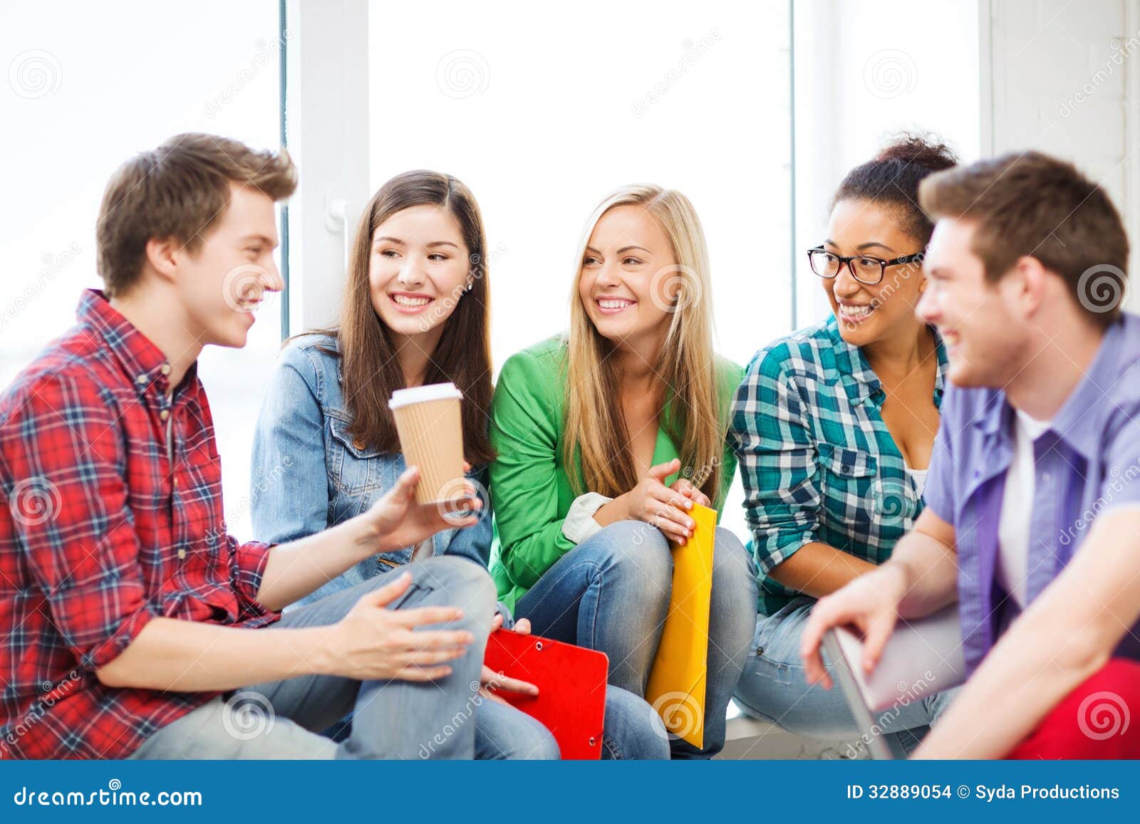 Students Communicating and Laughing at School Stock Photo - Image of ...