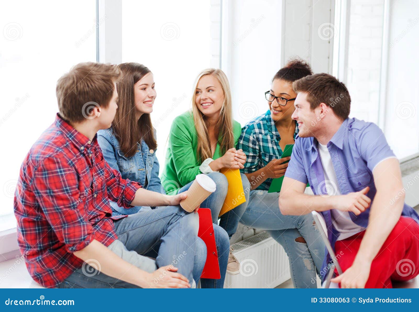 Students Communicating and Laughing at School Stock Image - Image of ...