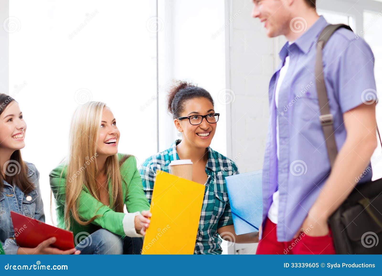 Students Communicating and Laughing at School Stock Image - Image of ...