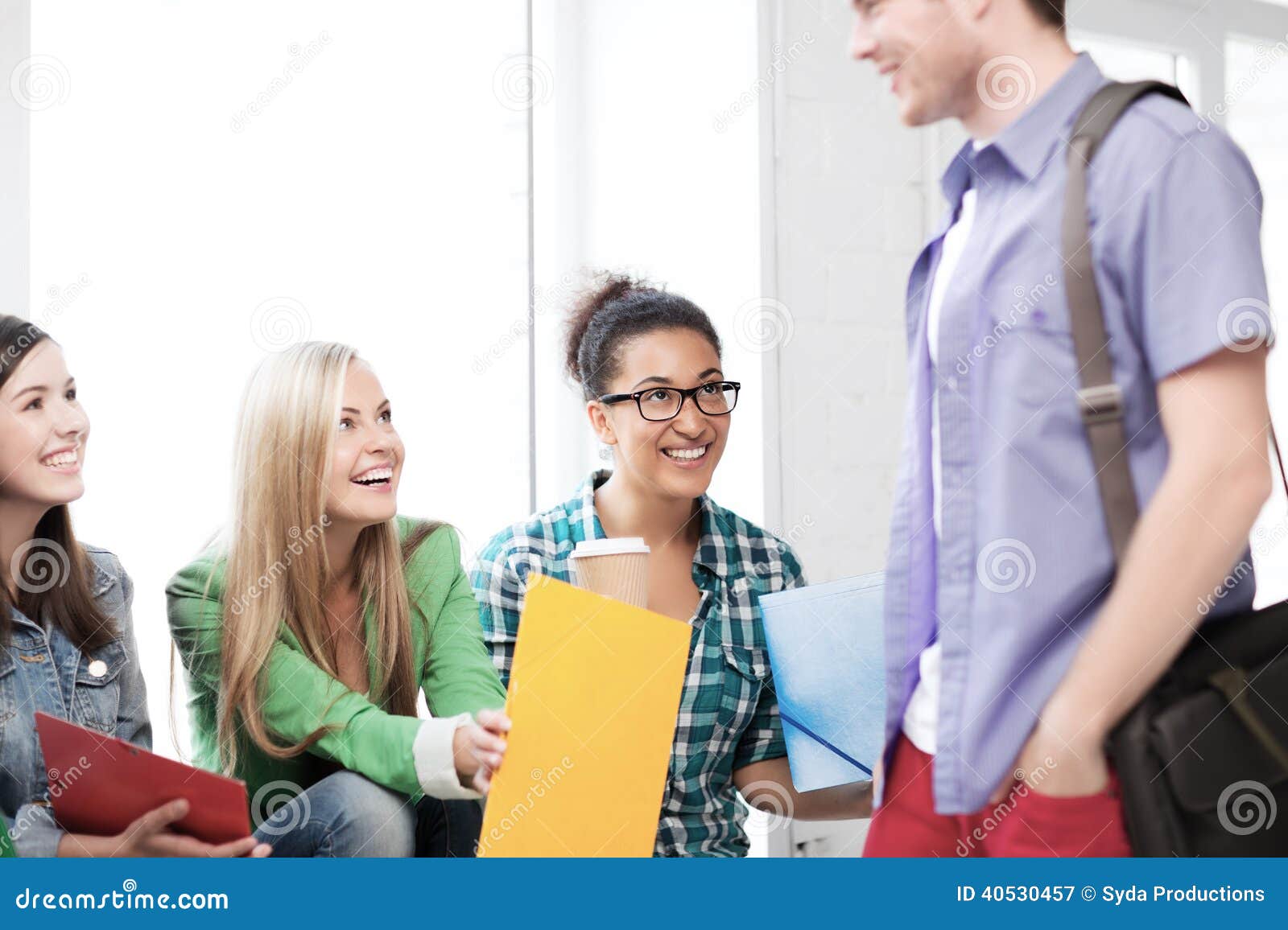 Students Communicating and Laughing at School Stock Image - Image of ...