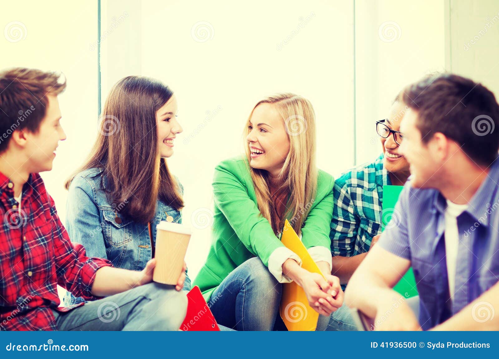Students Communicating and Laughing at School Stock Photo - Image of ...