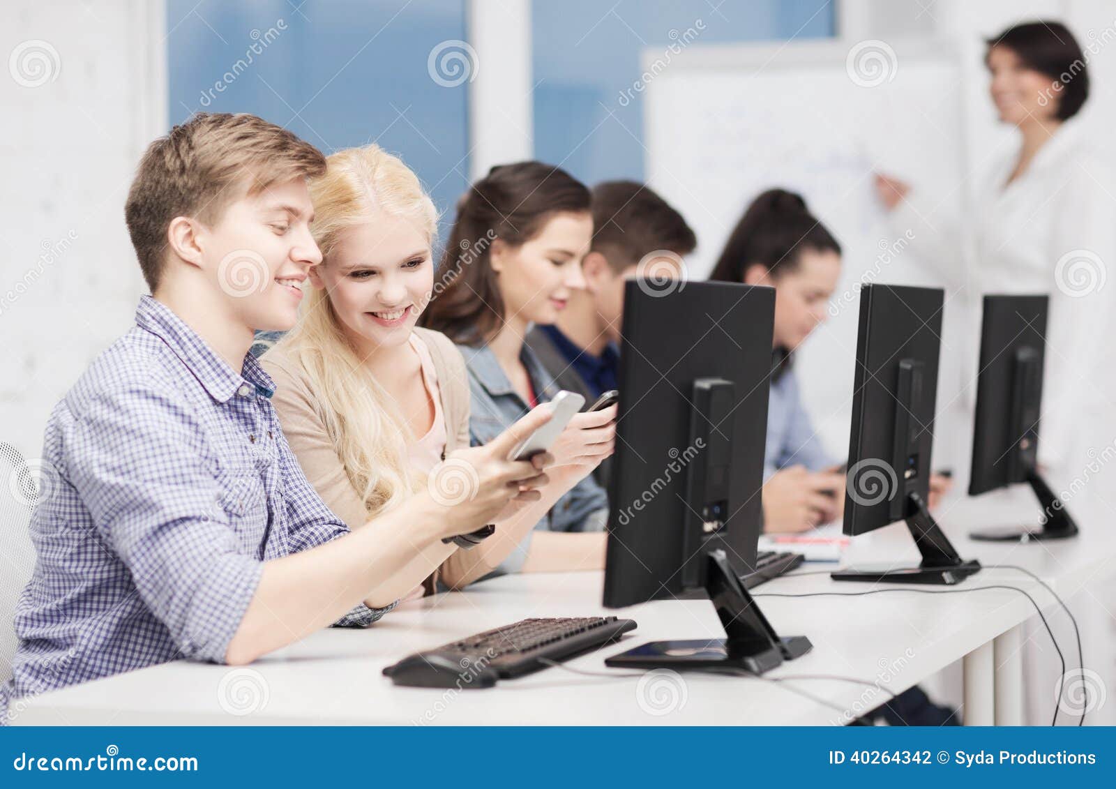 Students with Computer Monitor and Smartphones Stock Photo - Image of ...