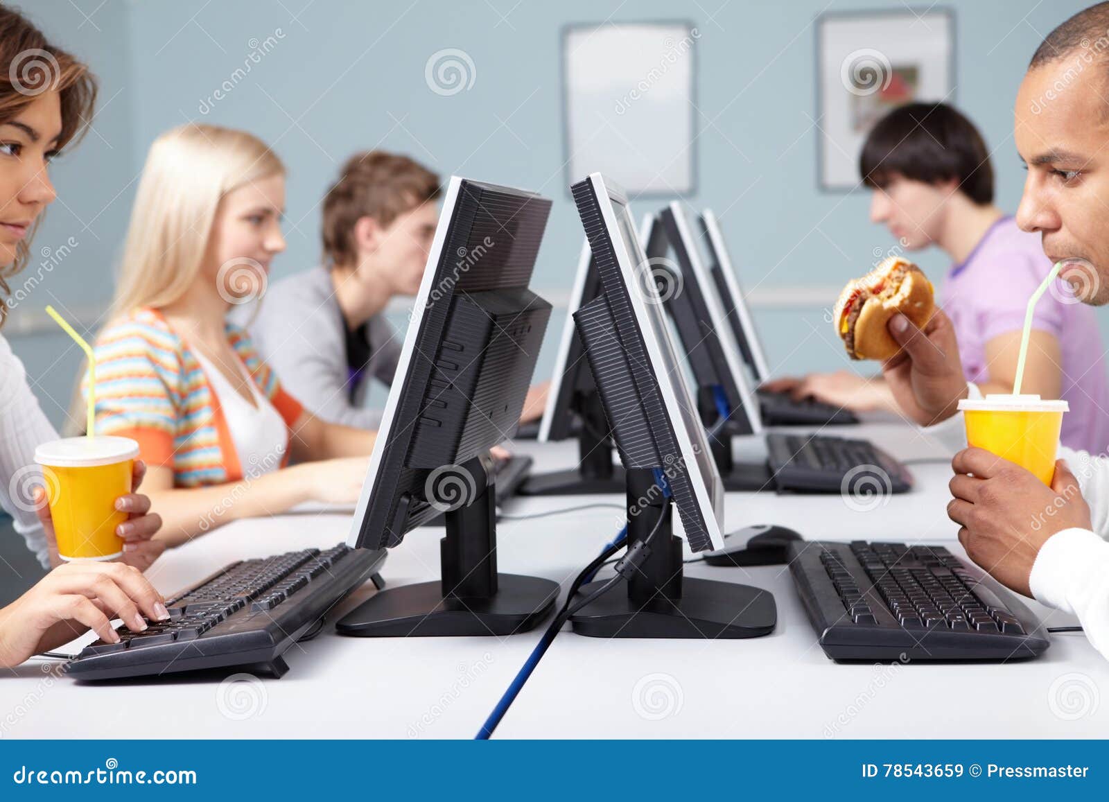 Students in computer room stock image. Image of table - 78543659