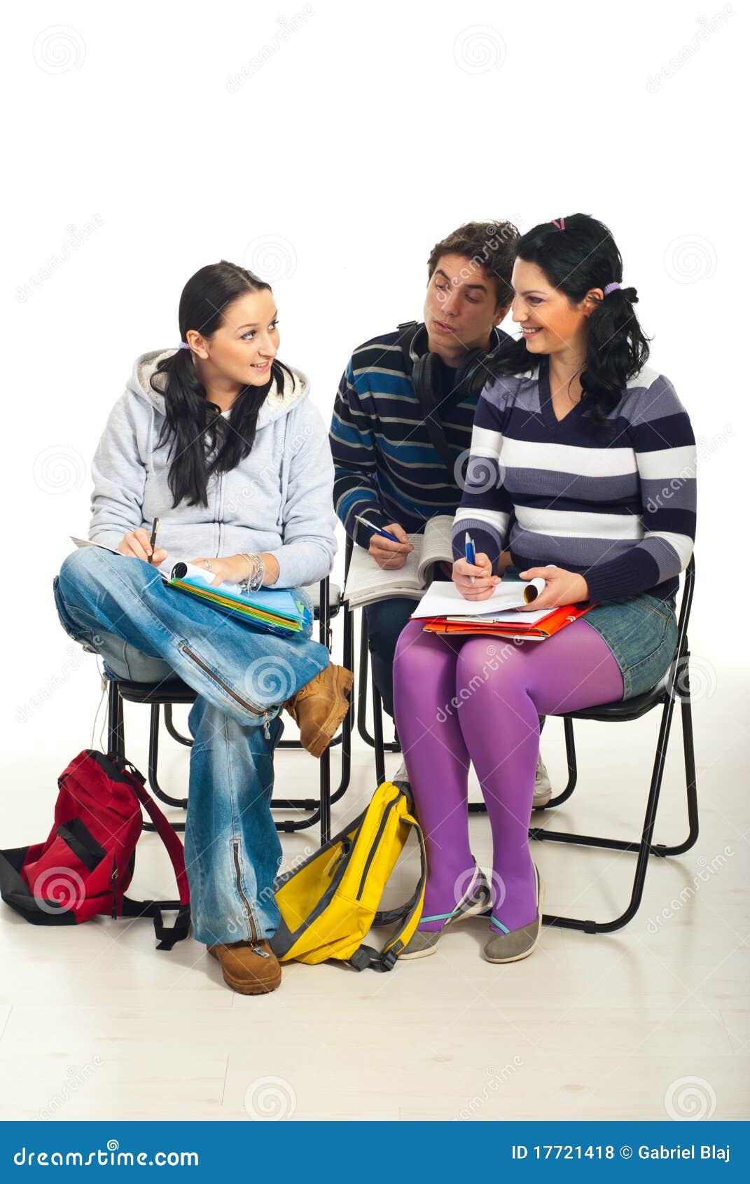 Students Conversation in Classroom Stock Photo - Image of books, girls ...