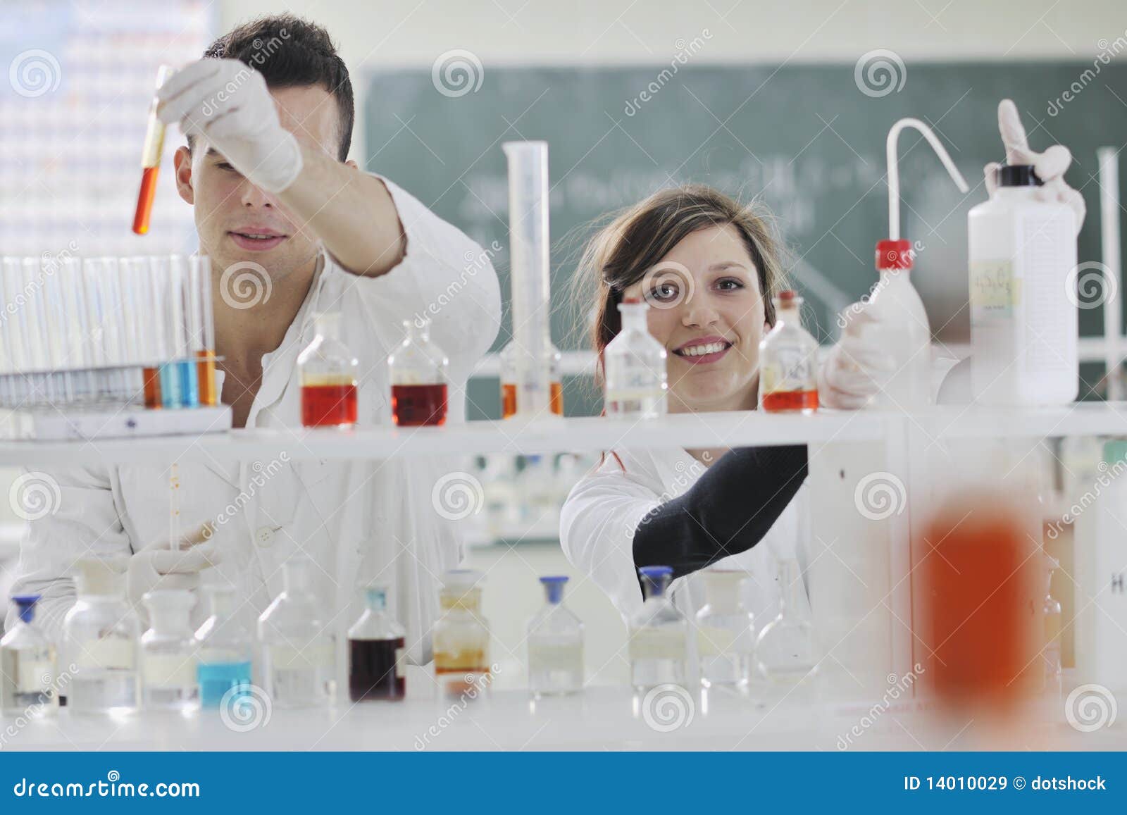 Students couple in lab stock image. Image of biology - 14010029