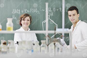 Students couple in lab stock photo. Image of bright, adult - 14010214