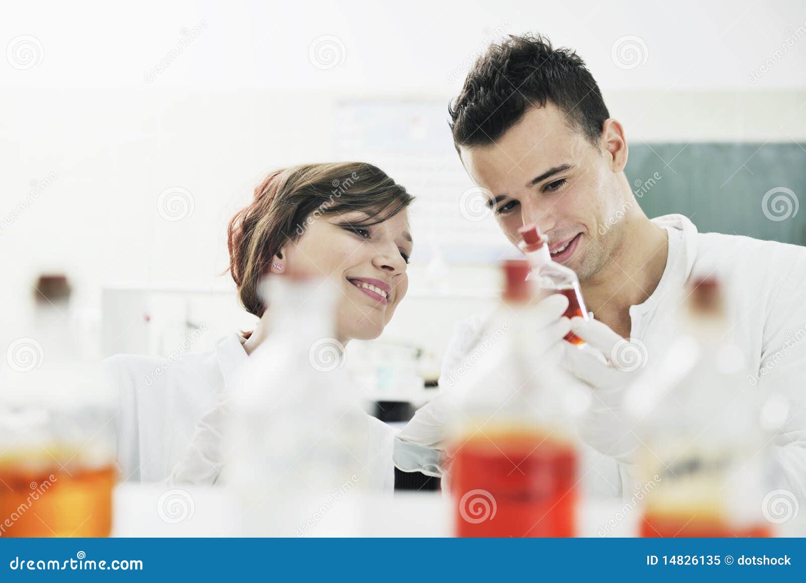 Students couple in lab stock image. Image of physician - 14826135
