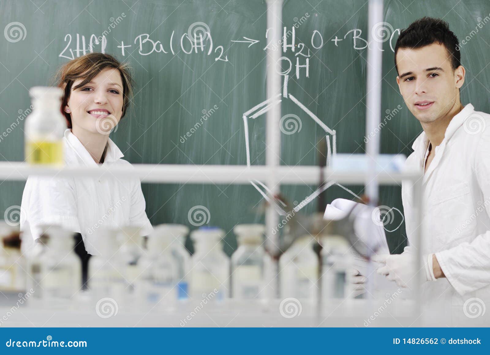 Students couple in lab stock photo. Image of science - 14826562