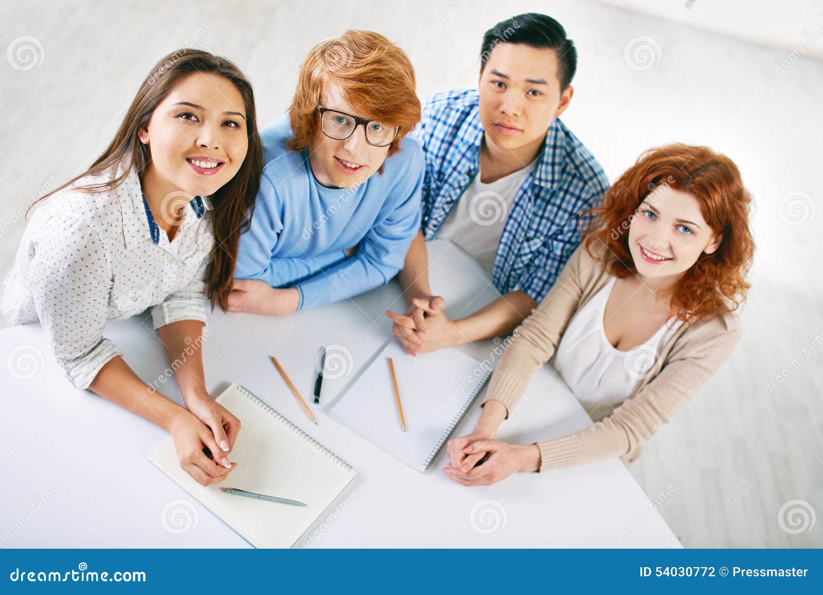 Students by desk stock photo. Image of multiethnic, happy - 54030772