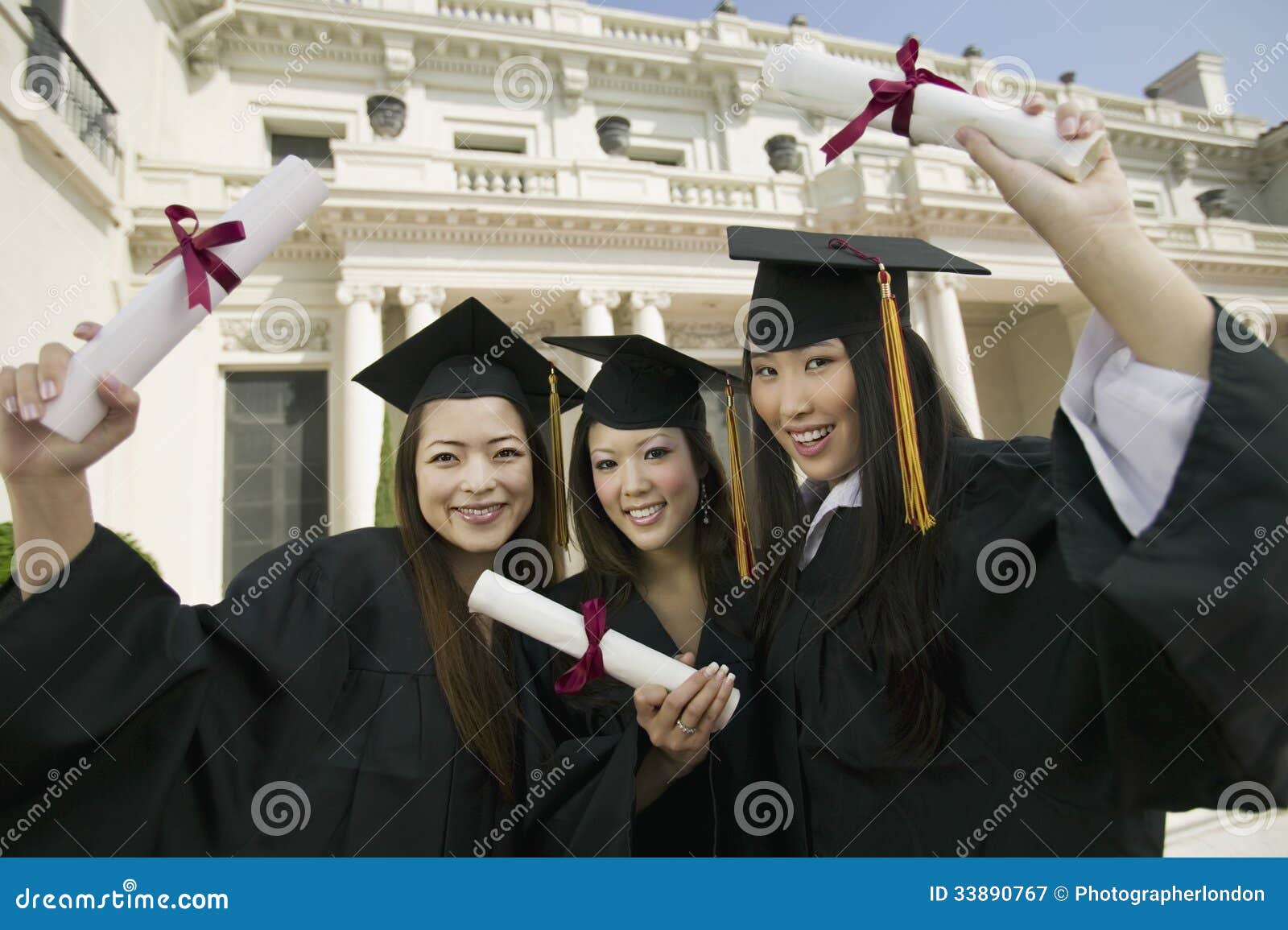 Students with Diplomas Standing in Front of University Stock Image ...