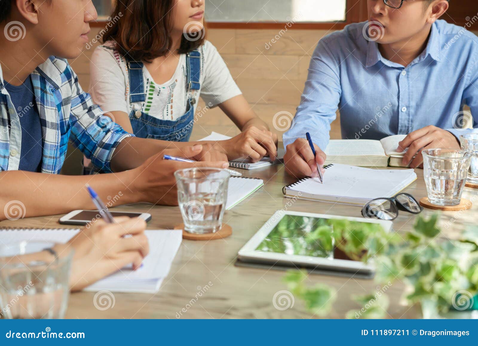 Students Discussing Homework Stock Image - Image of people, idea: 111897211