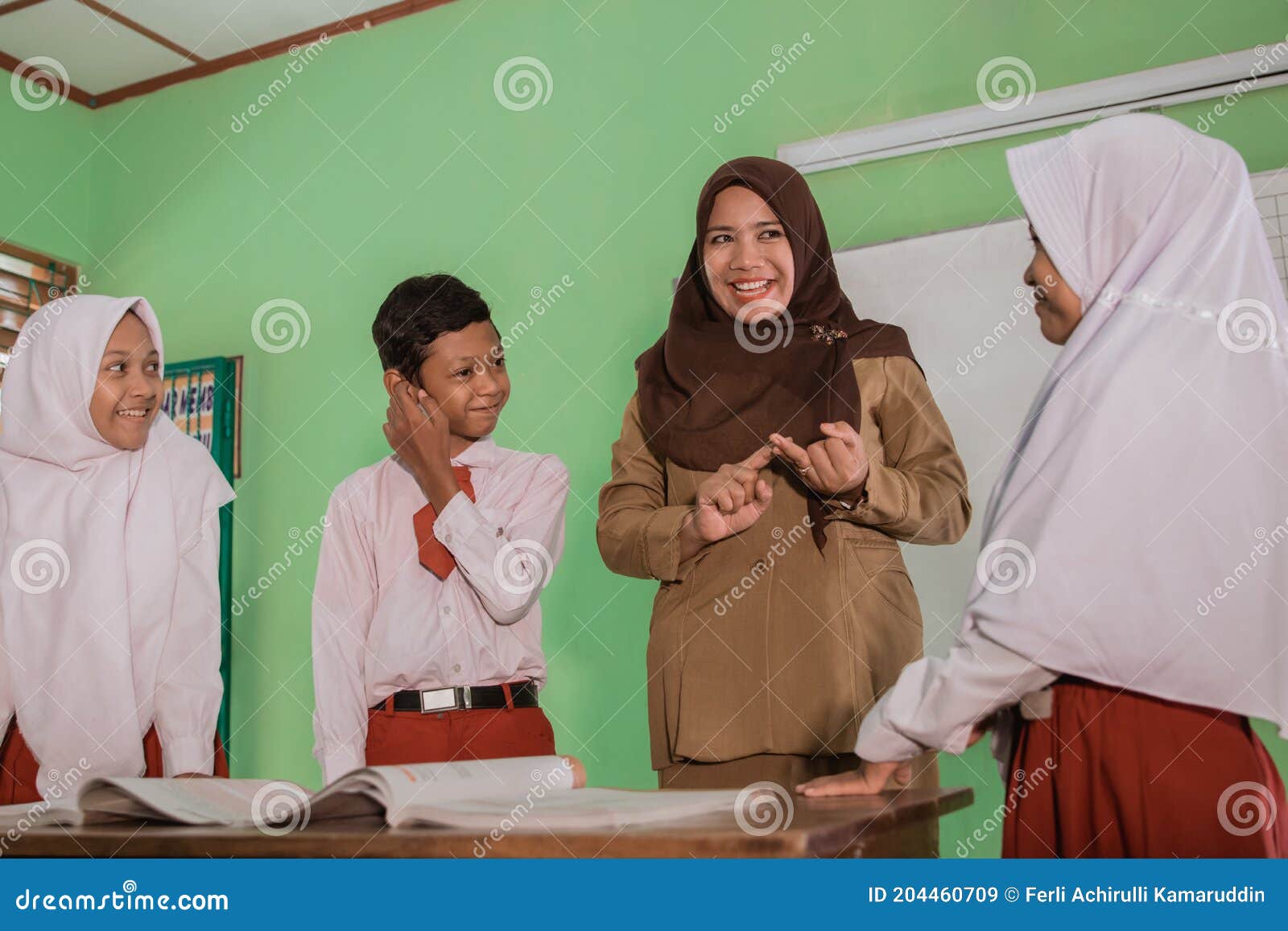 Students Discussing with Teacher Stock Image - Image of primary ...