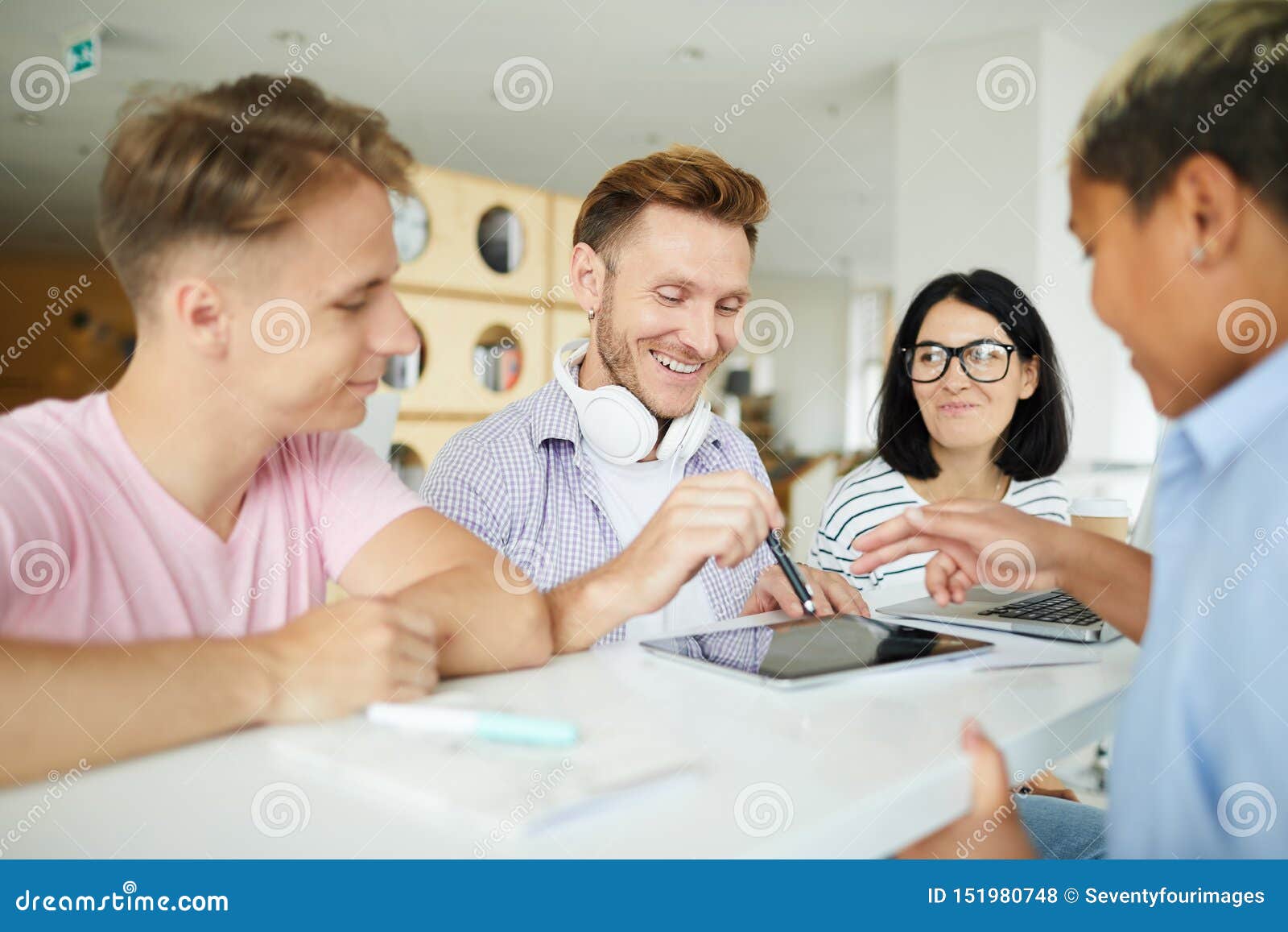 Students Discussing University Project in Library Stock Photo - Image ...