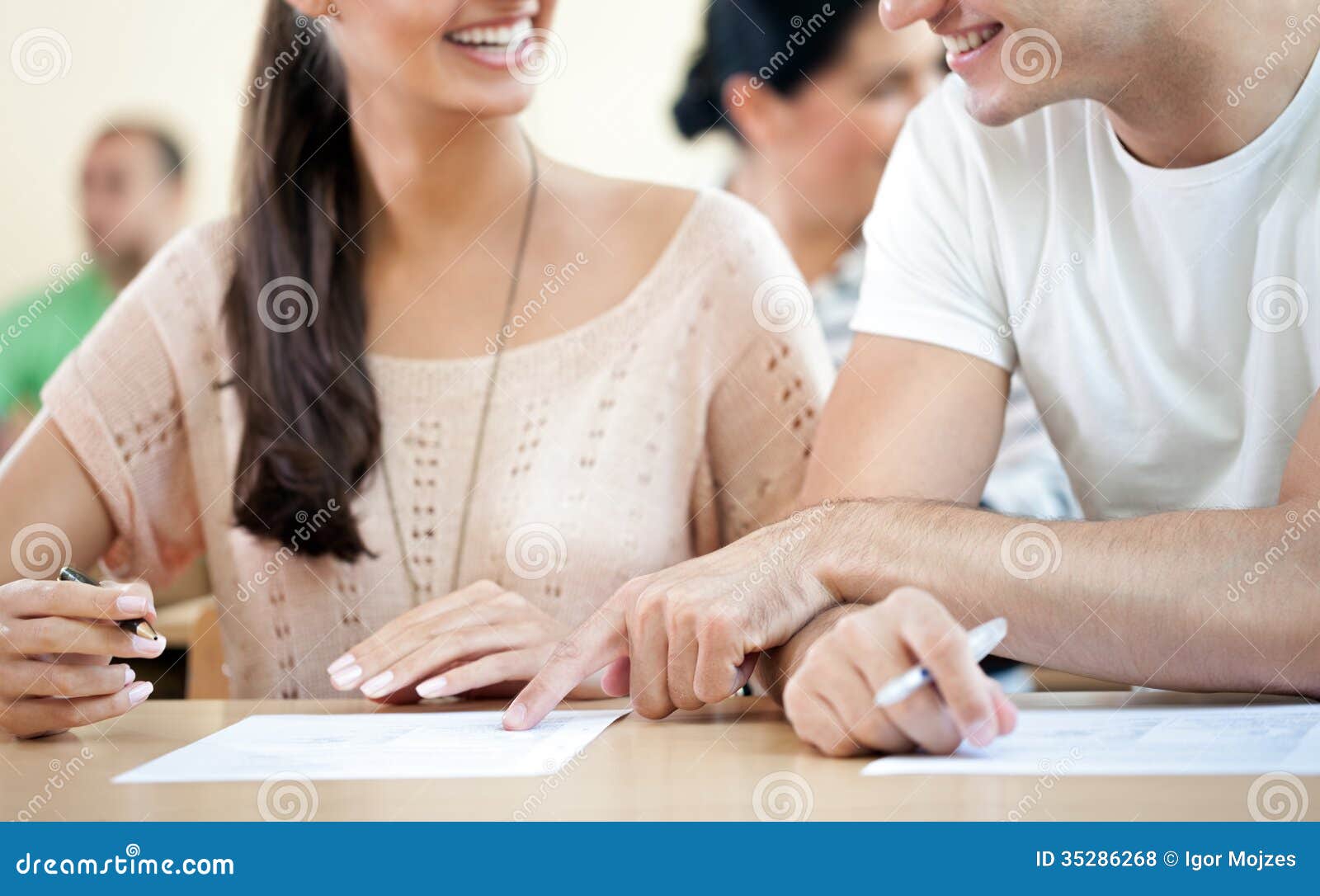 Students discussing work stock photo. Image of friendship - 35286268
