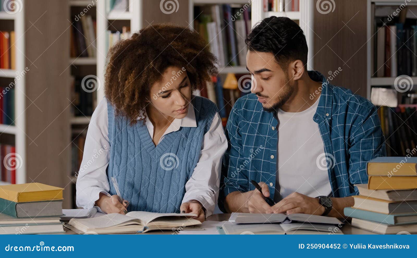 Students Do Homework in Library Teamwork Working on Joint Project Cute ...