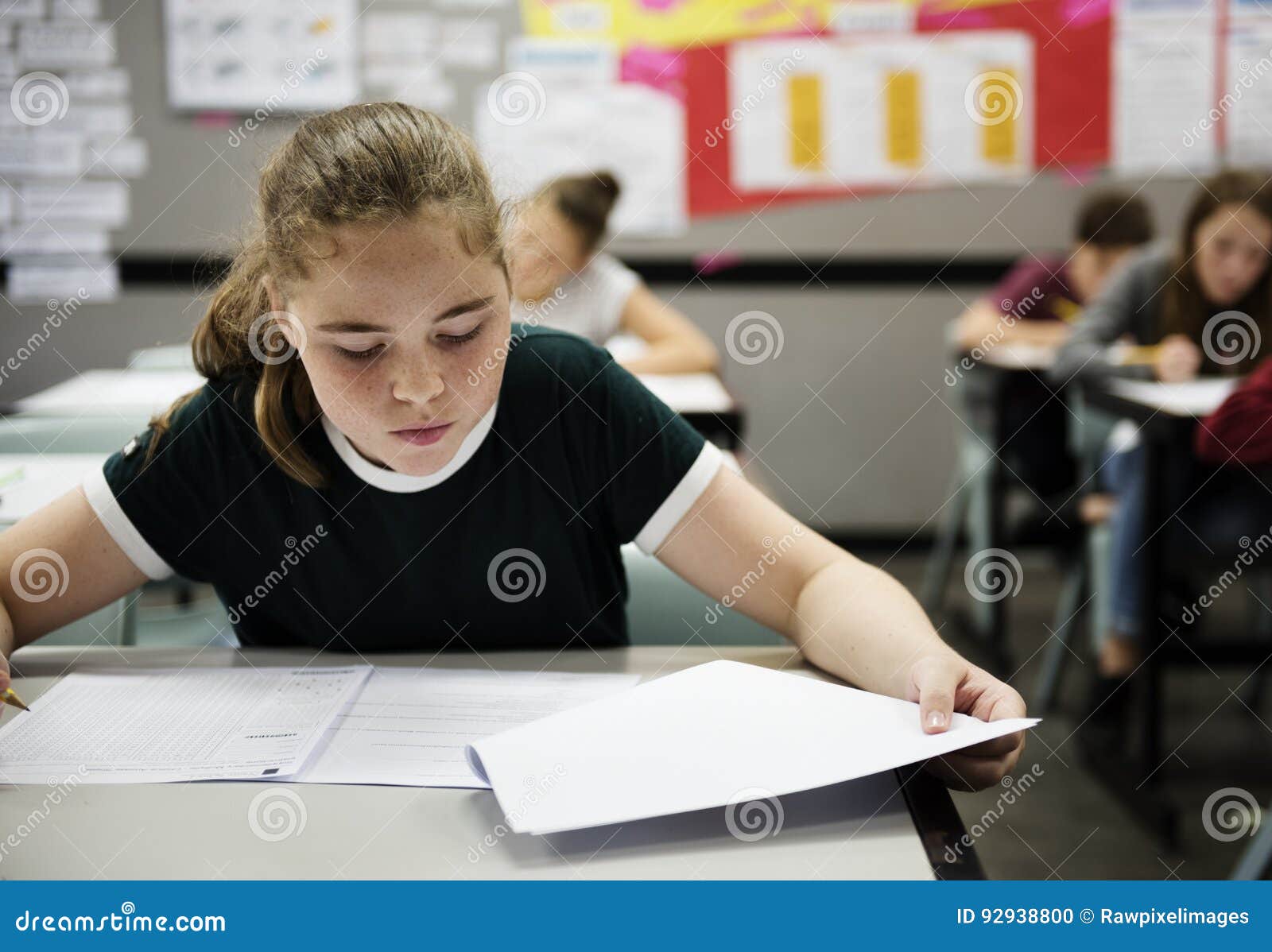 Students Doing Exam in Classroom Stock Photo - Image of paper, exam ...