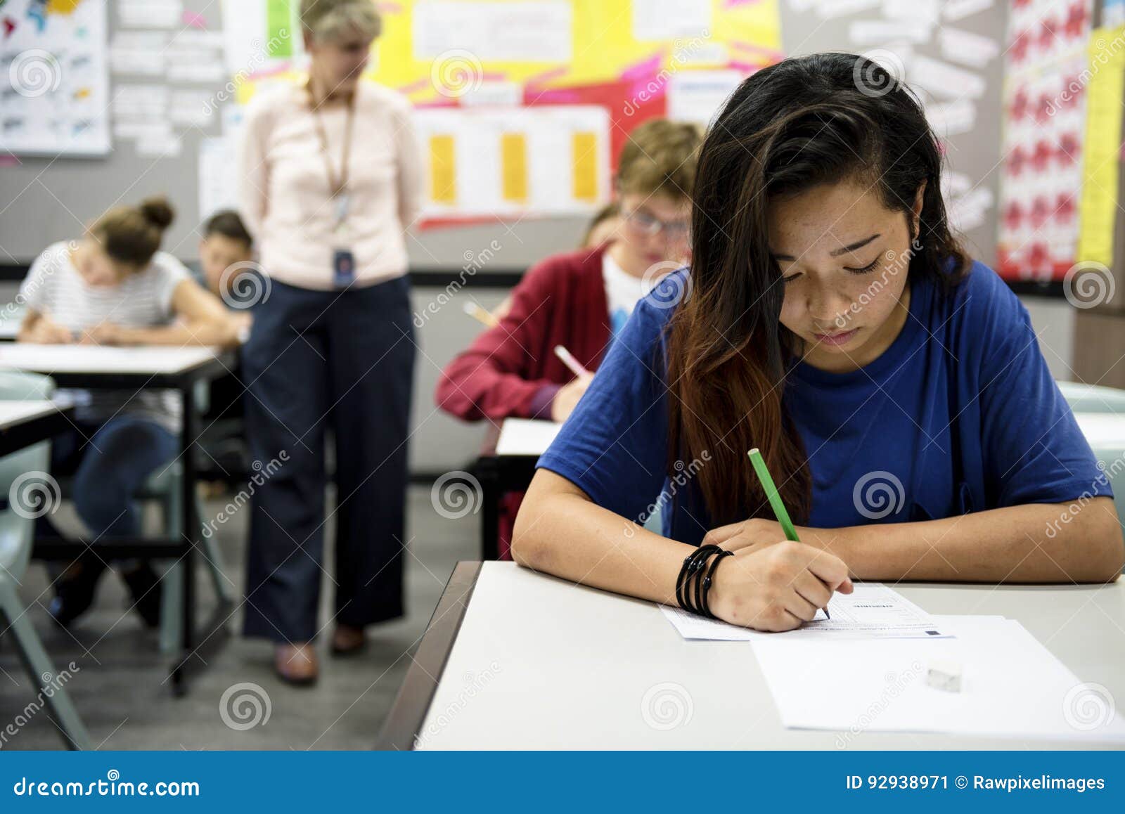 Students Doing the Exam in Classroom Stock Image - Image of girls ...