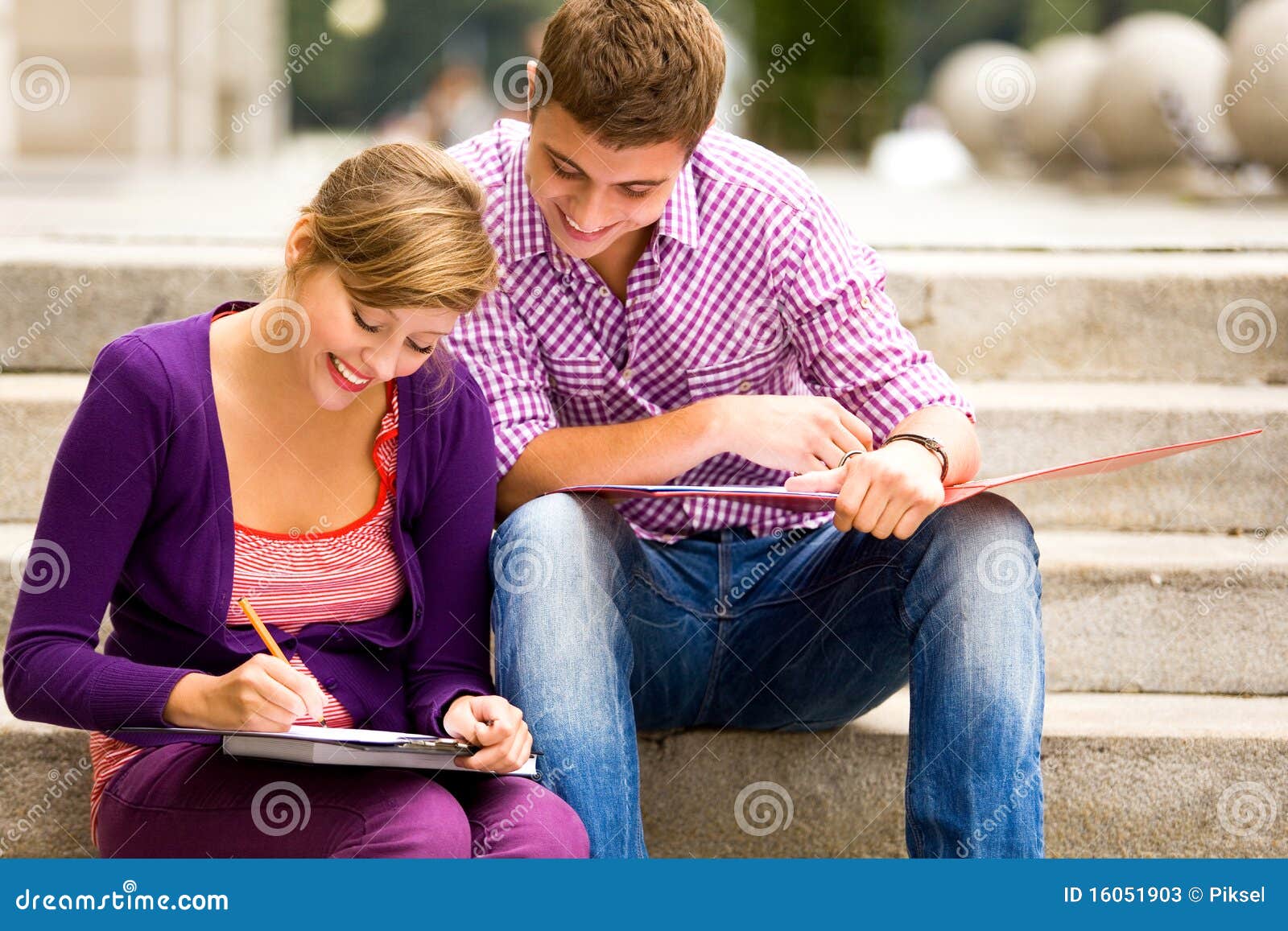 Students doing homework stock image. Image of laughing - 16051903