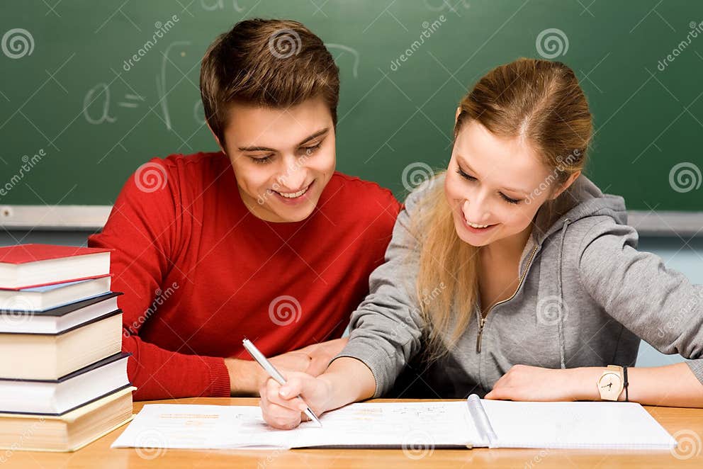 Students doing homework stock photo. Image of friendship - 21825702
