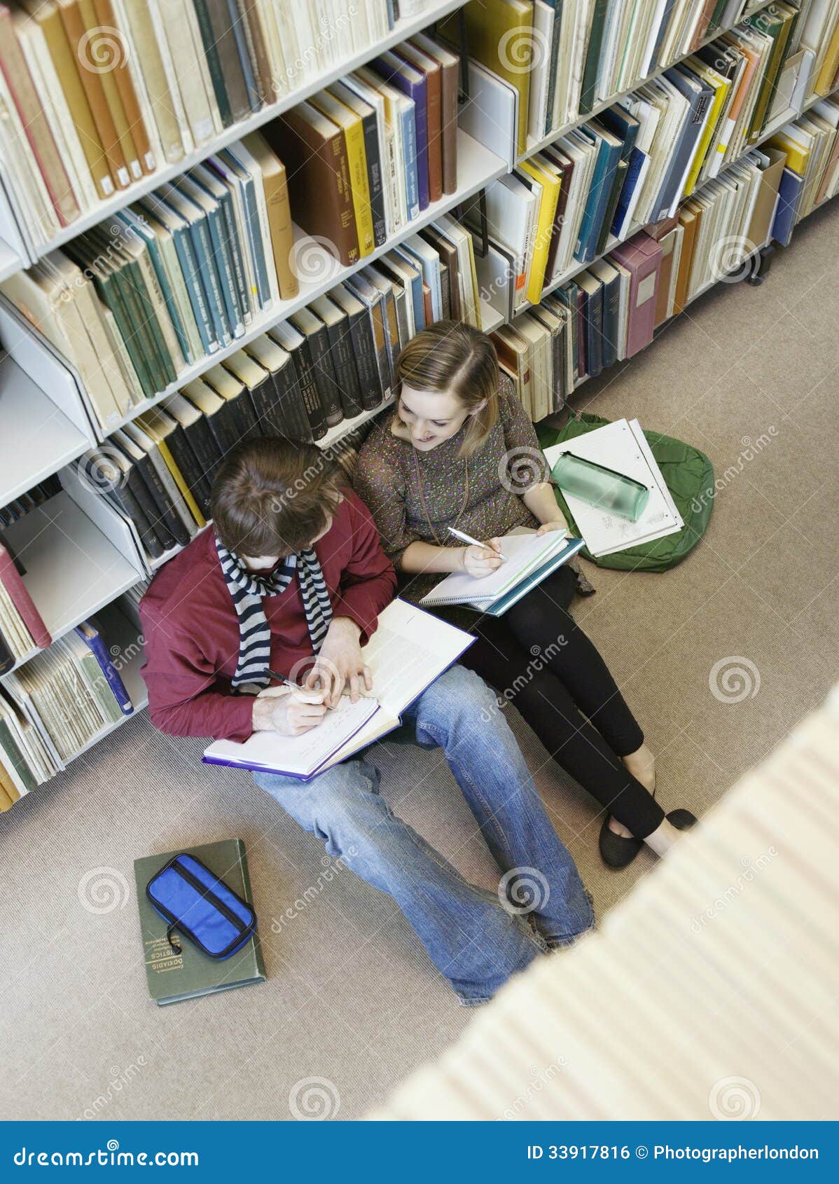 Students Doing Homework on Floor in Library Editorial Photo - Image of ...