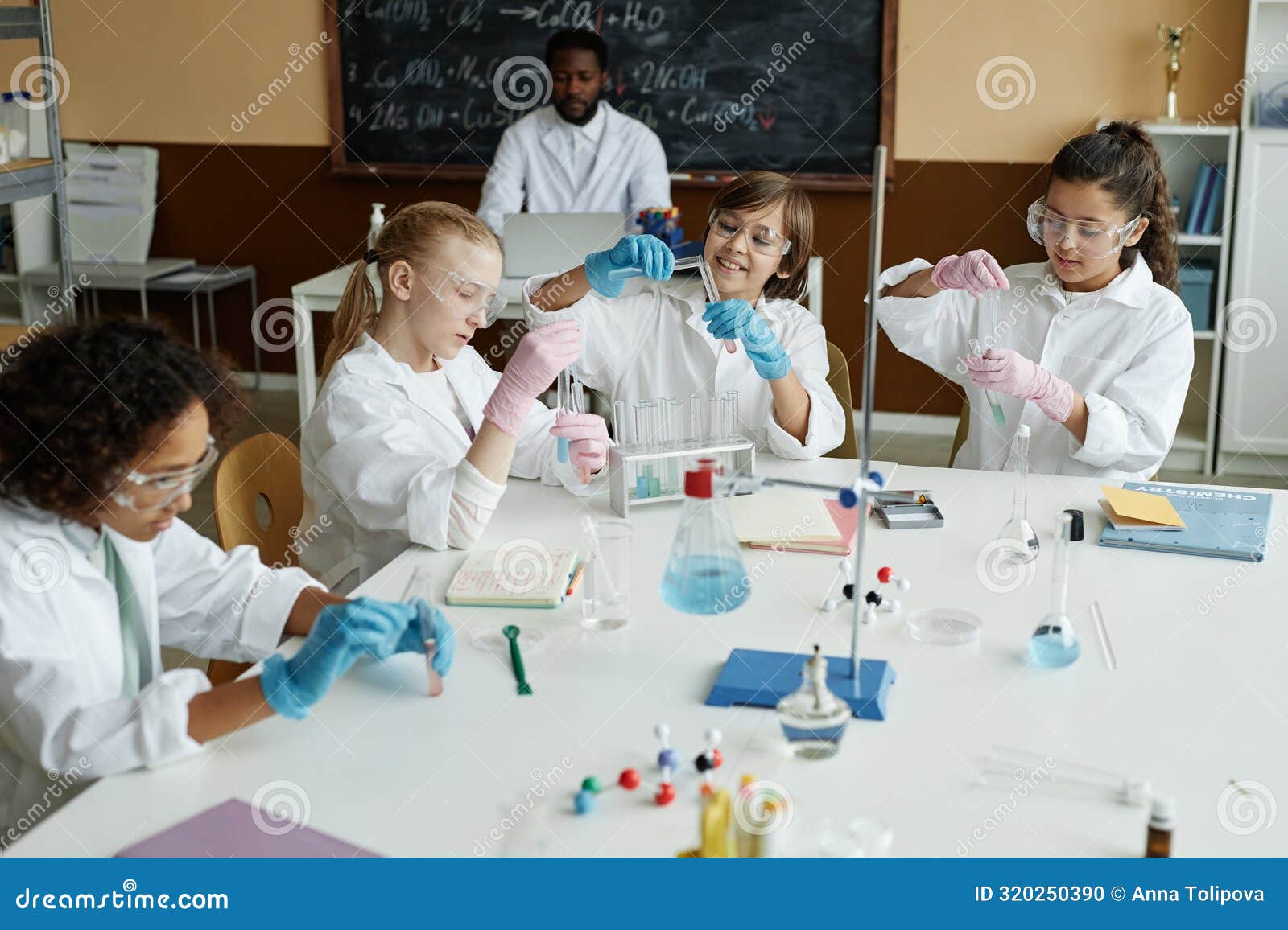 Students Doing Lab Experiments during Lesson Stock Photo - Image of ...